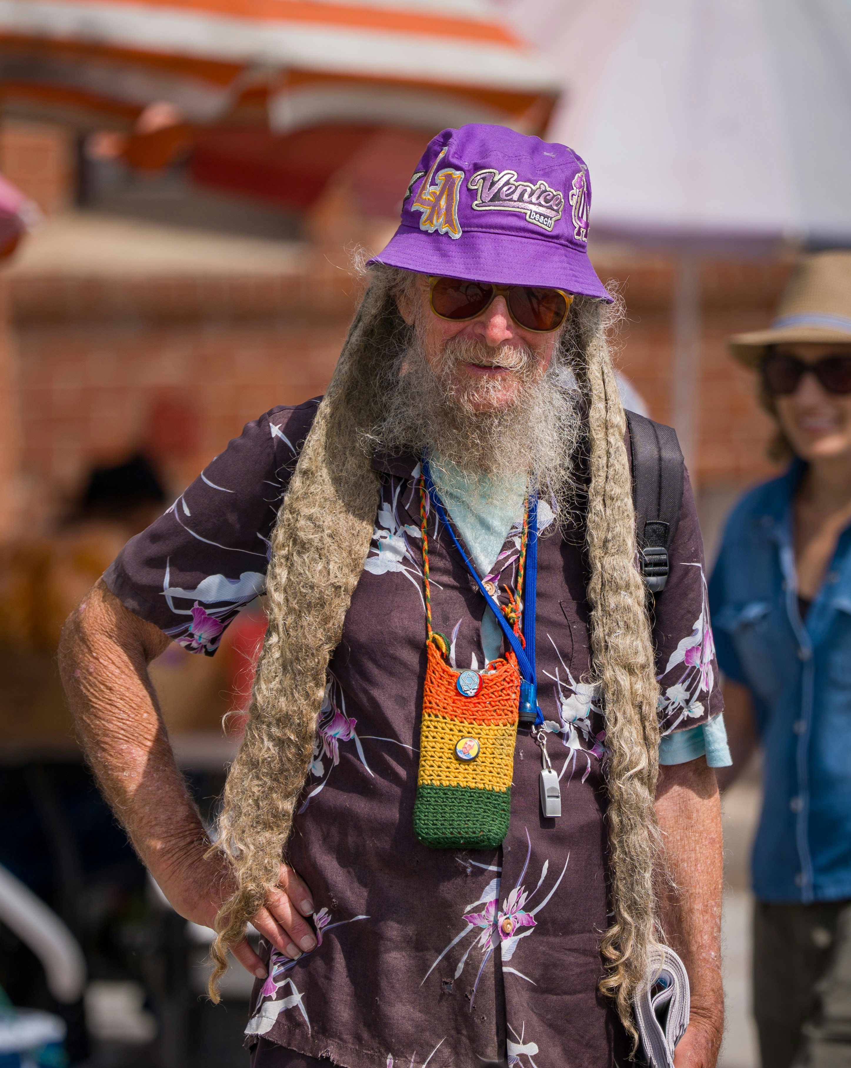 Colorful Entertainer Under the Sunlit Tent