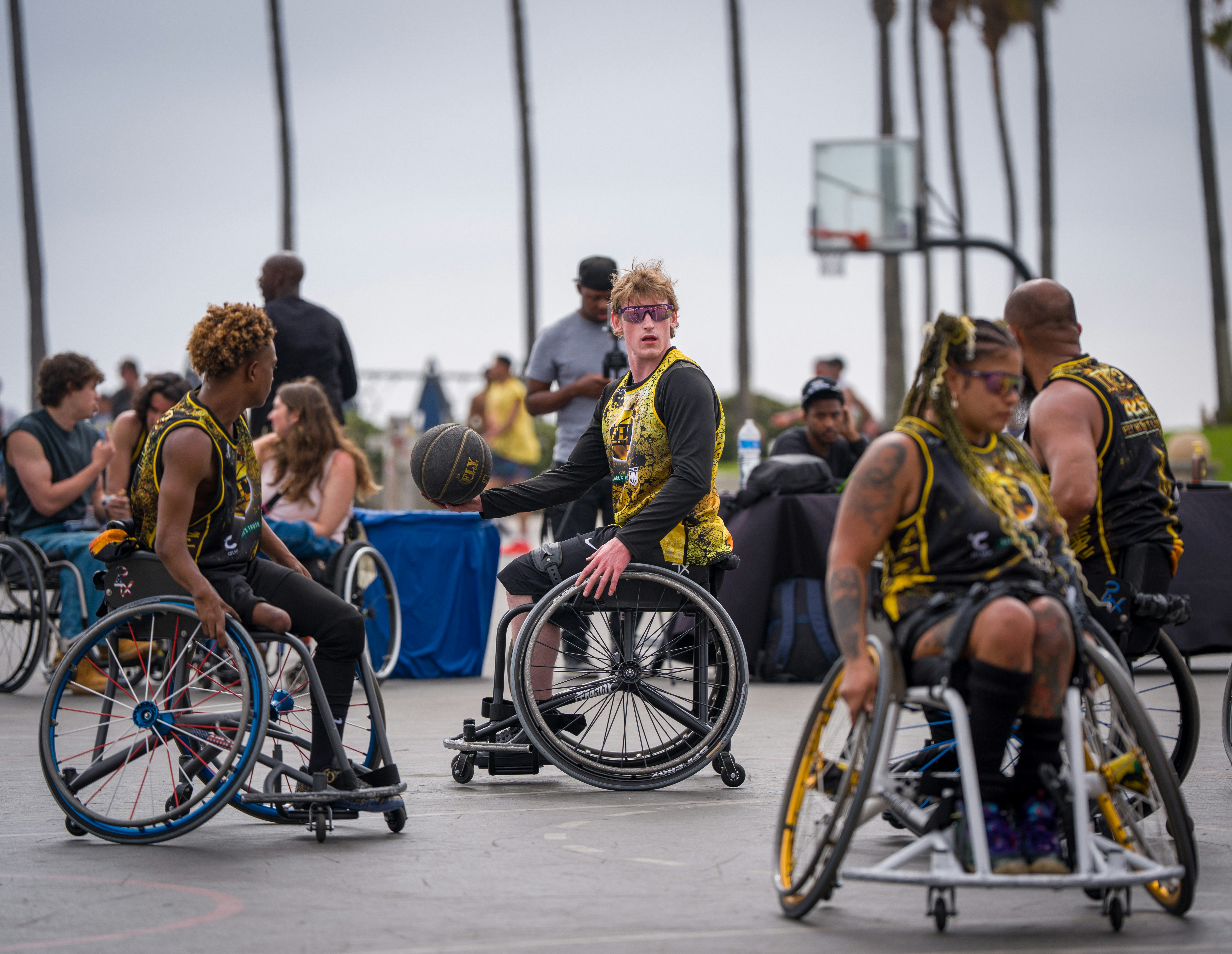 Wheelchair Basketball on a Sunny Beach Boardwalk
