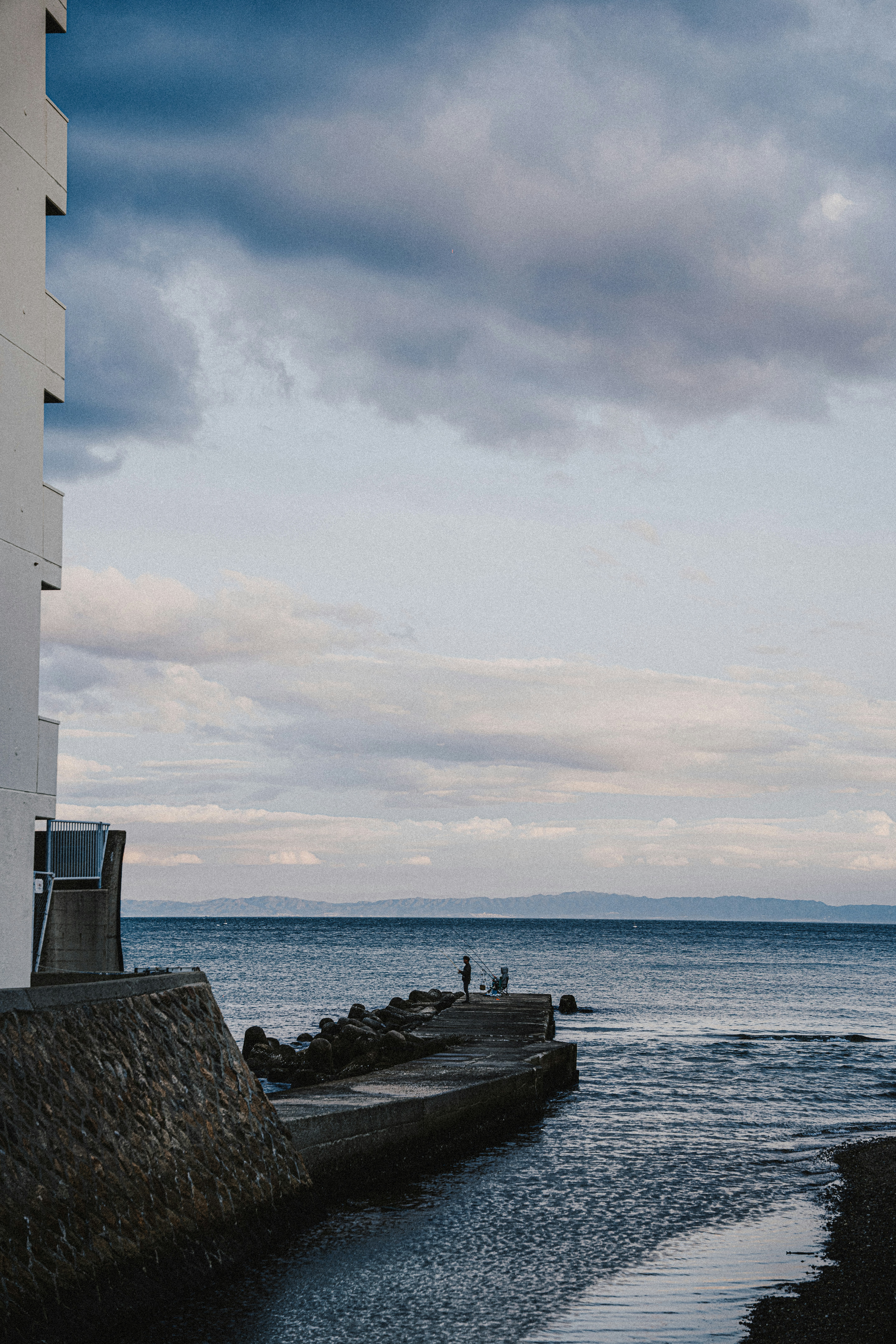 Harbor Pier at Dusk: A Quiet Confluence of Sea and Structure