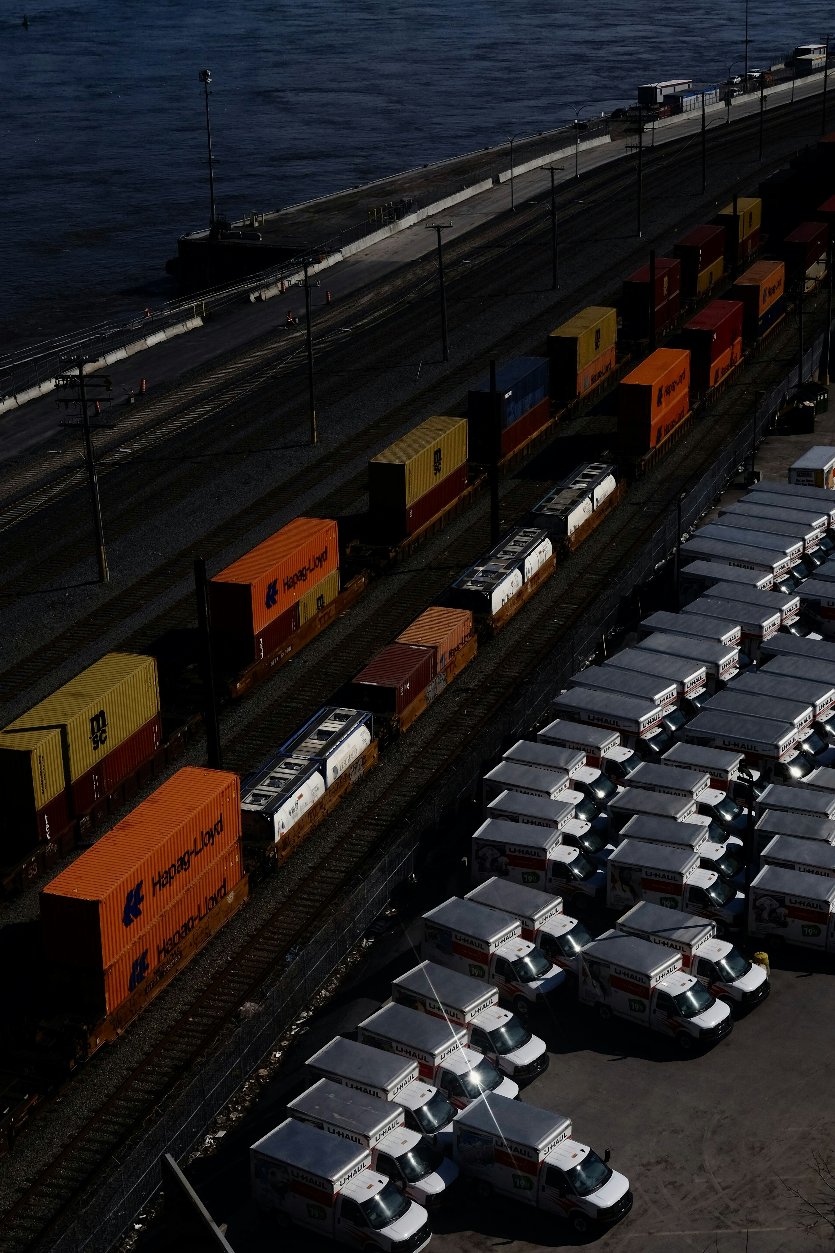 Containers at the Dock: ADiagonal Corridor of Freight and Trucks