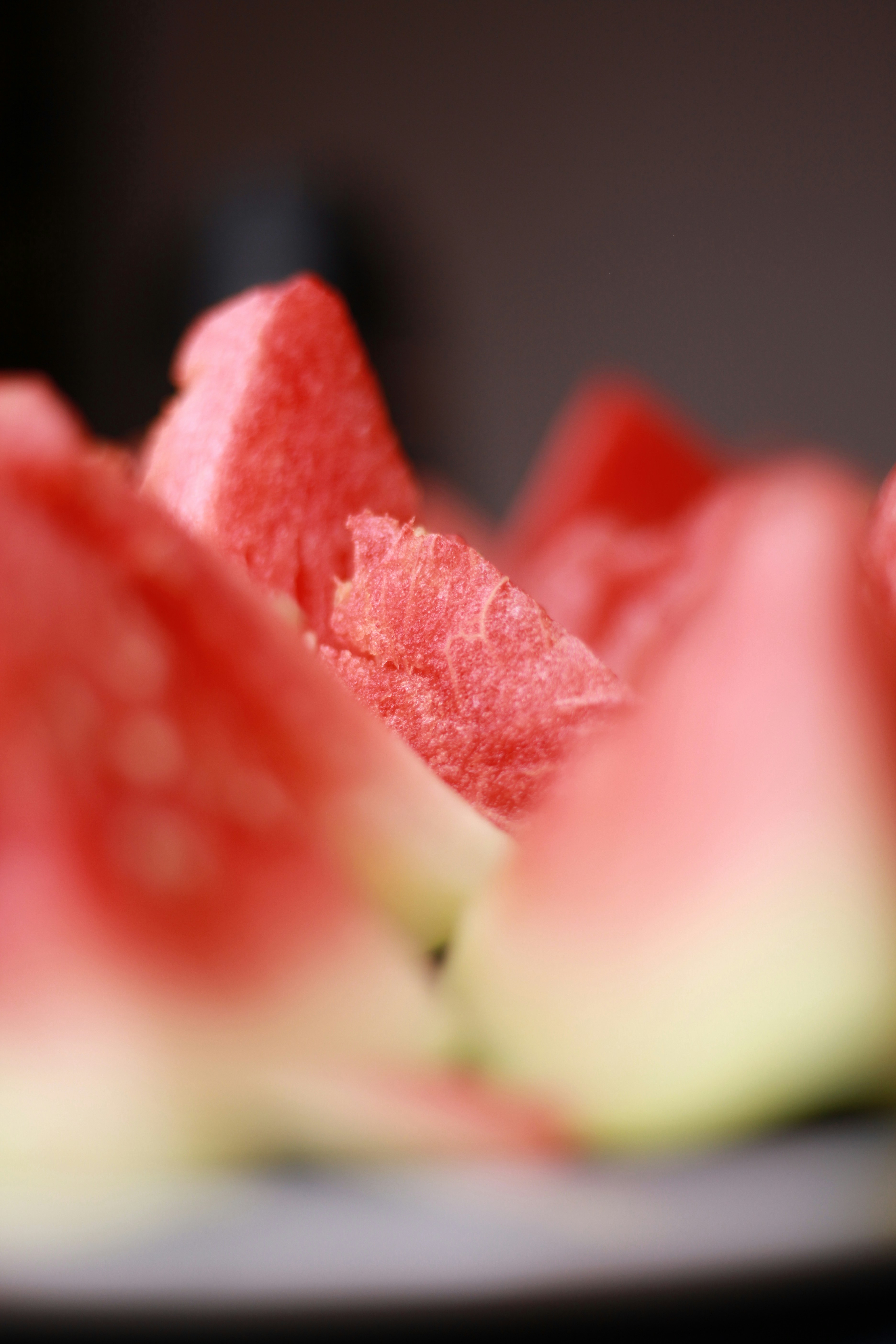 Close-up of a succulent watermelon rind peaks in soft focus