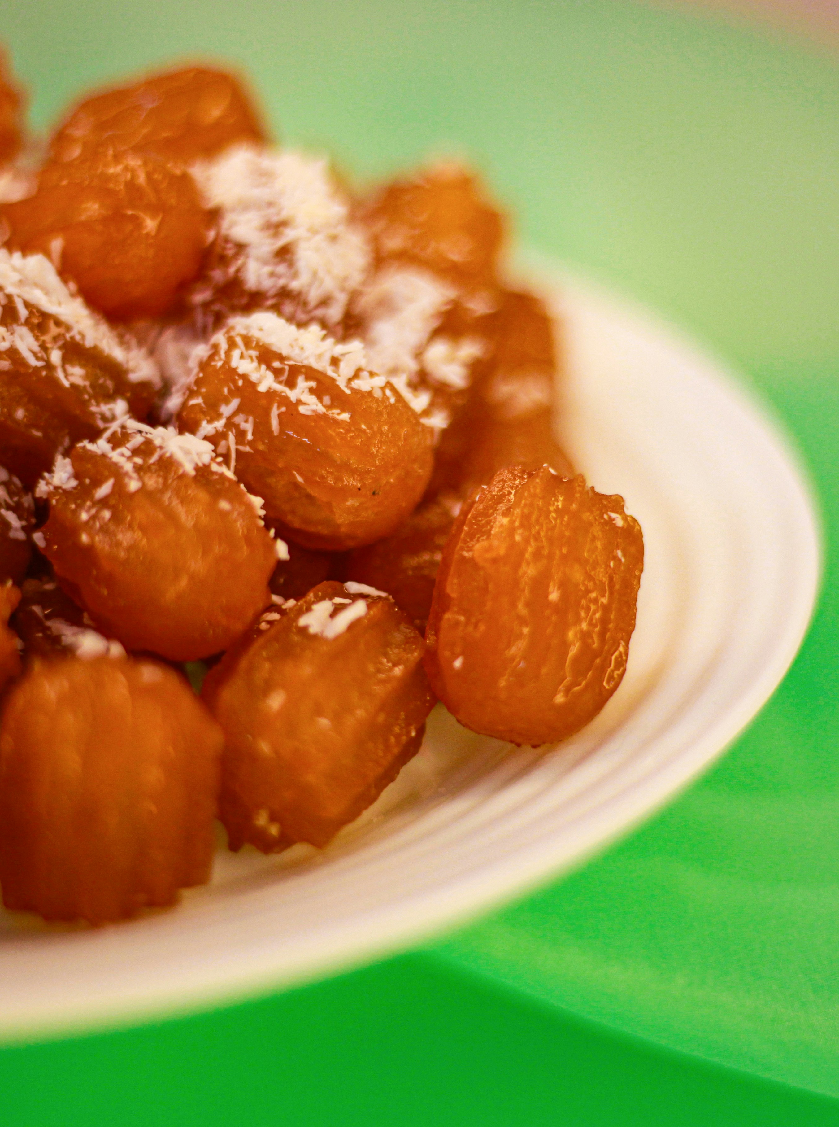 Sugared Almond Confections on a Green Plate