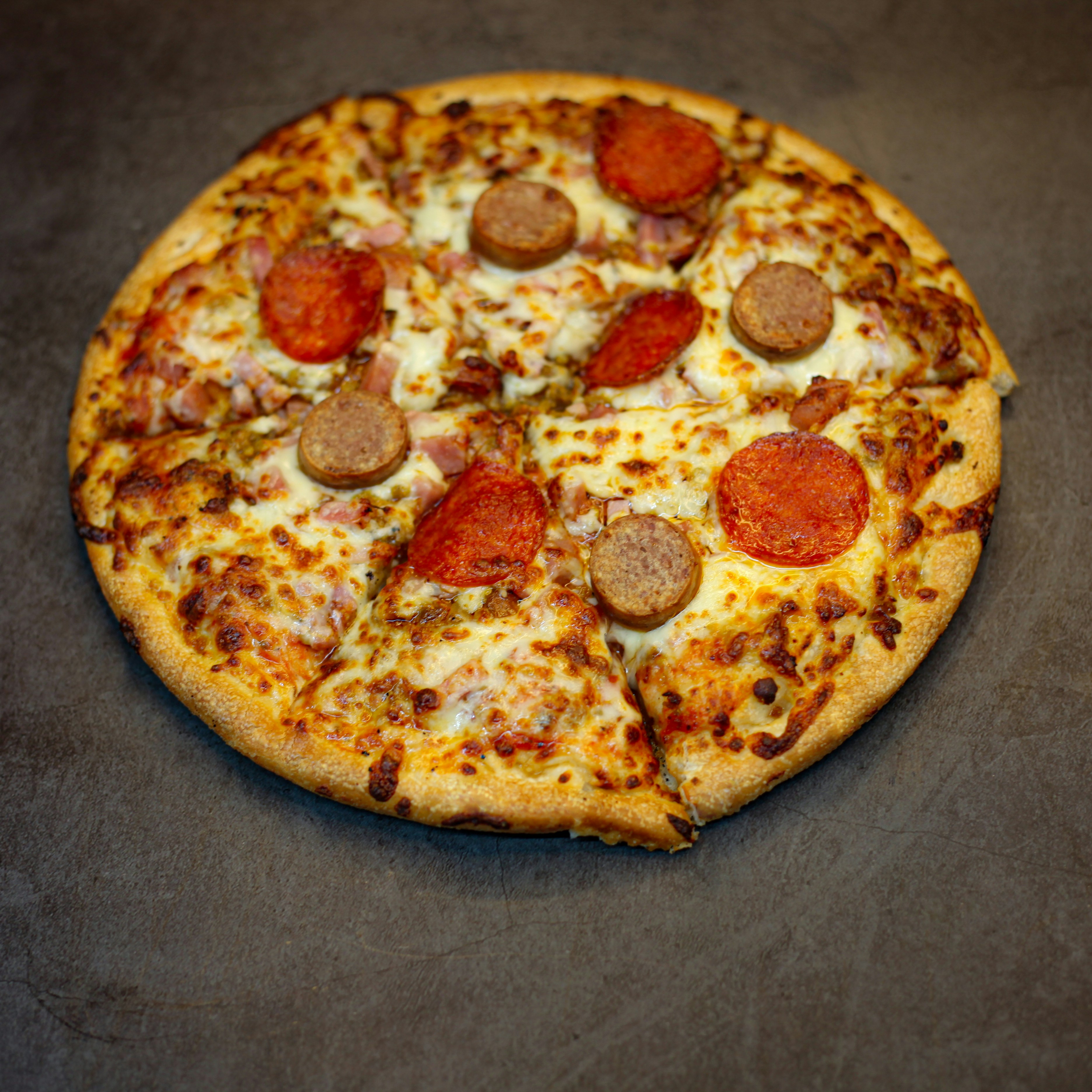 Pepperoni Relay: A Warm Circular Slice of Oven-Browned Comfort