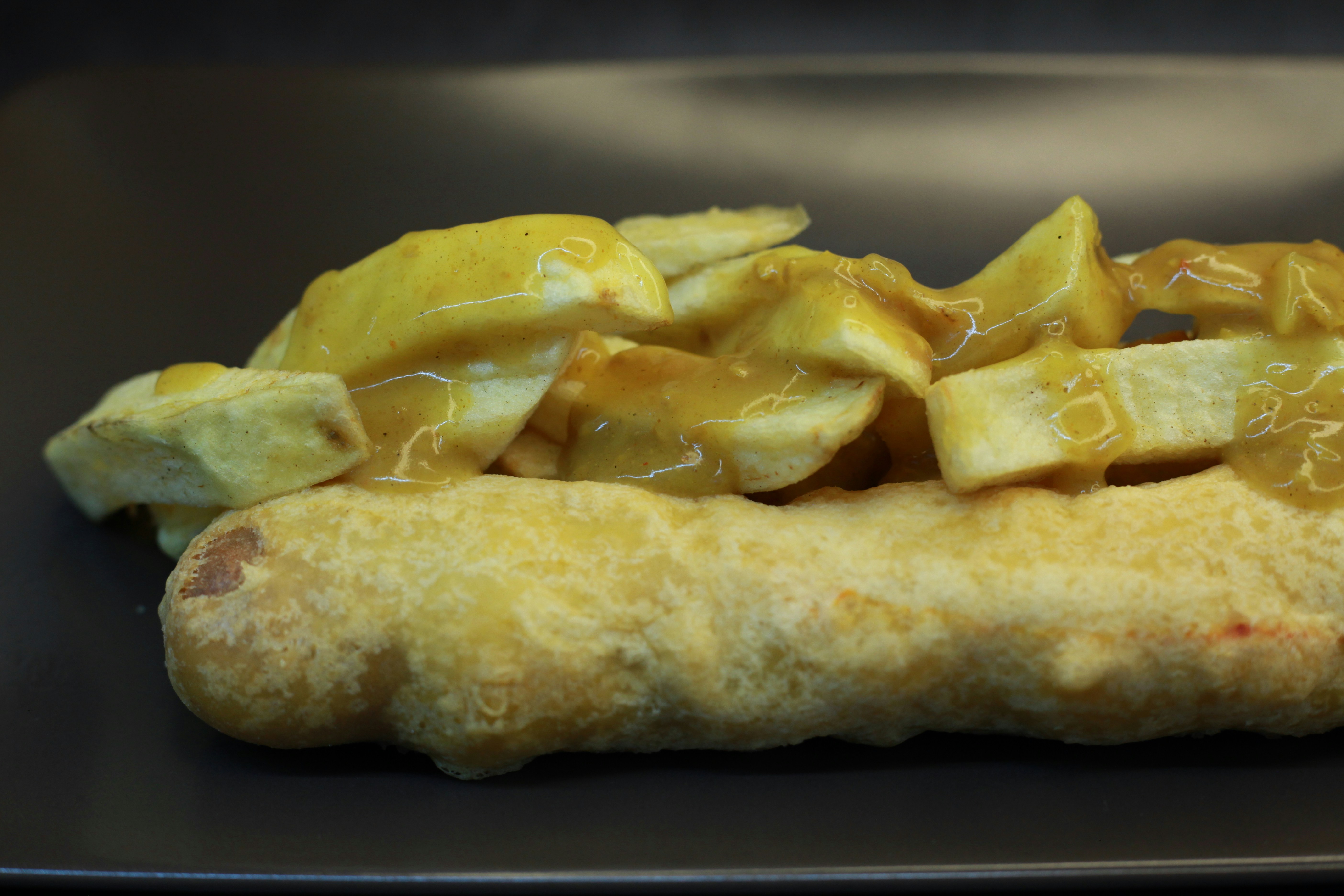 Golden Hot Dog Winterlude: Slices of Fries on a Magma-Plate