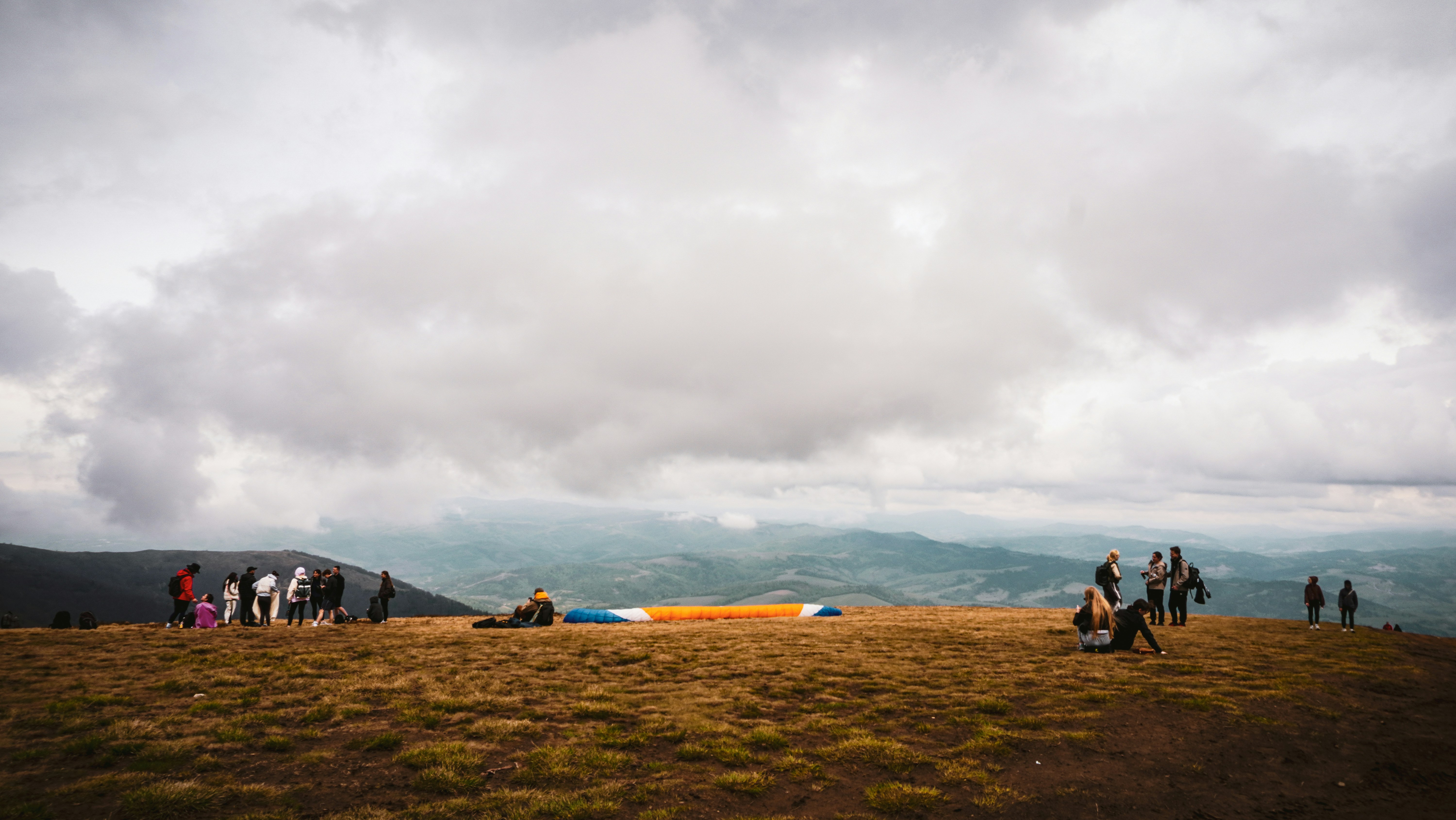 Horizon Crew: People Gather at a Distant Hilltop