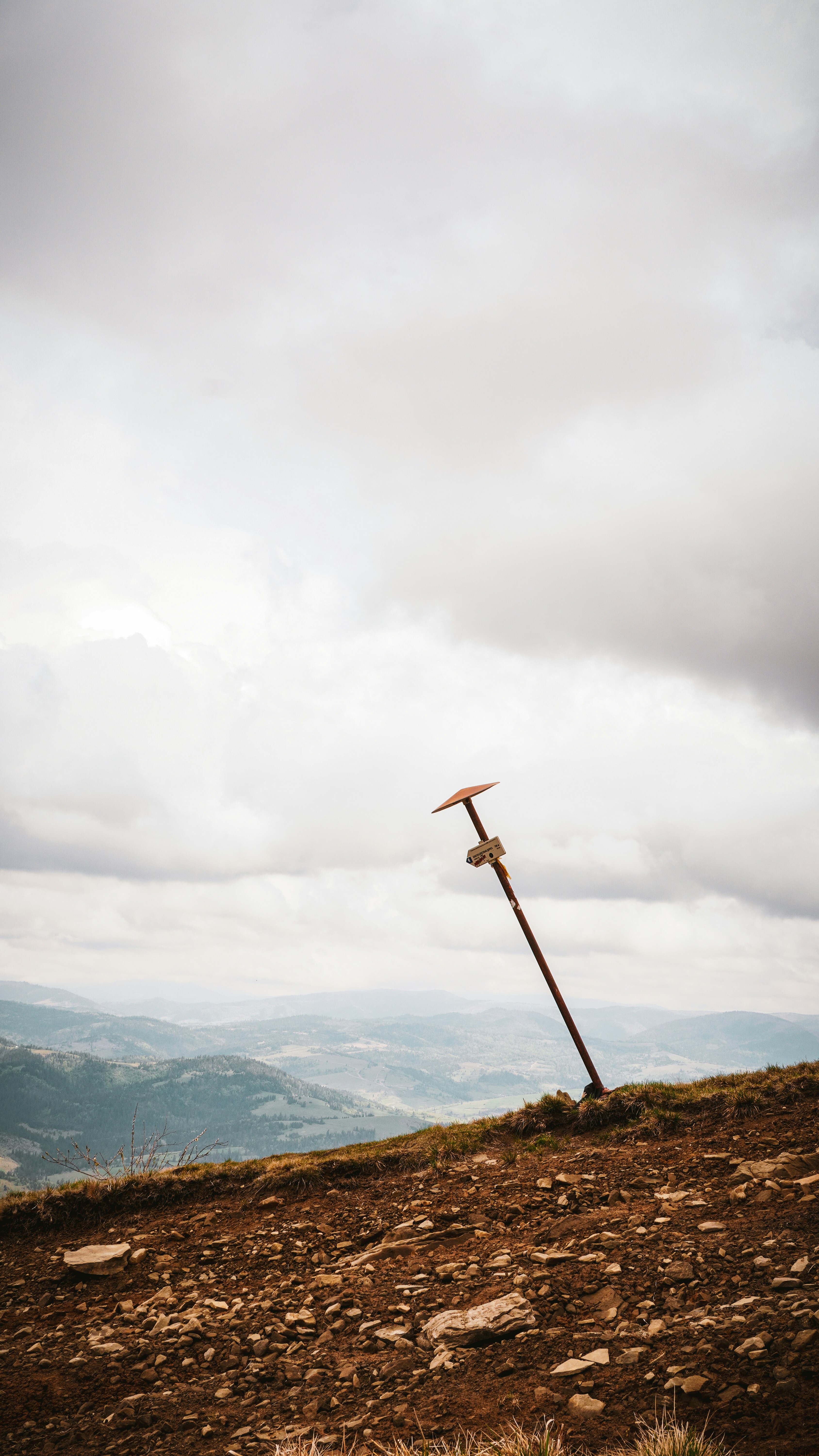 Distant Horizon Marker on a Wind-swept Ridge