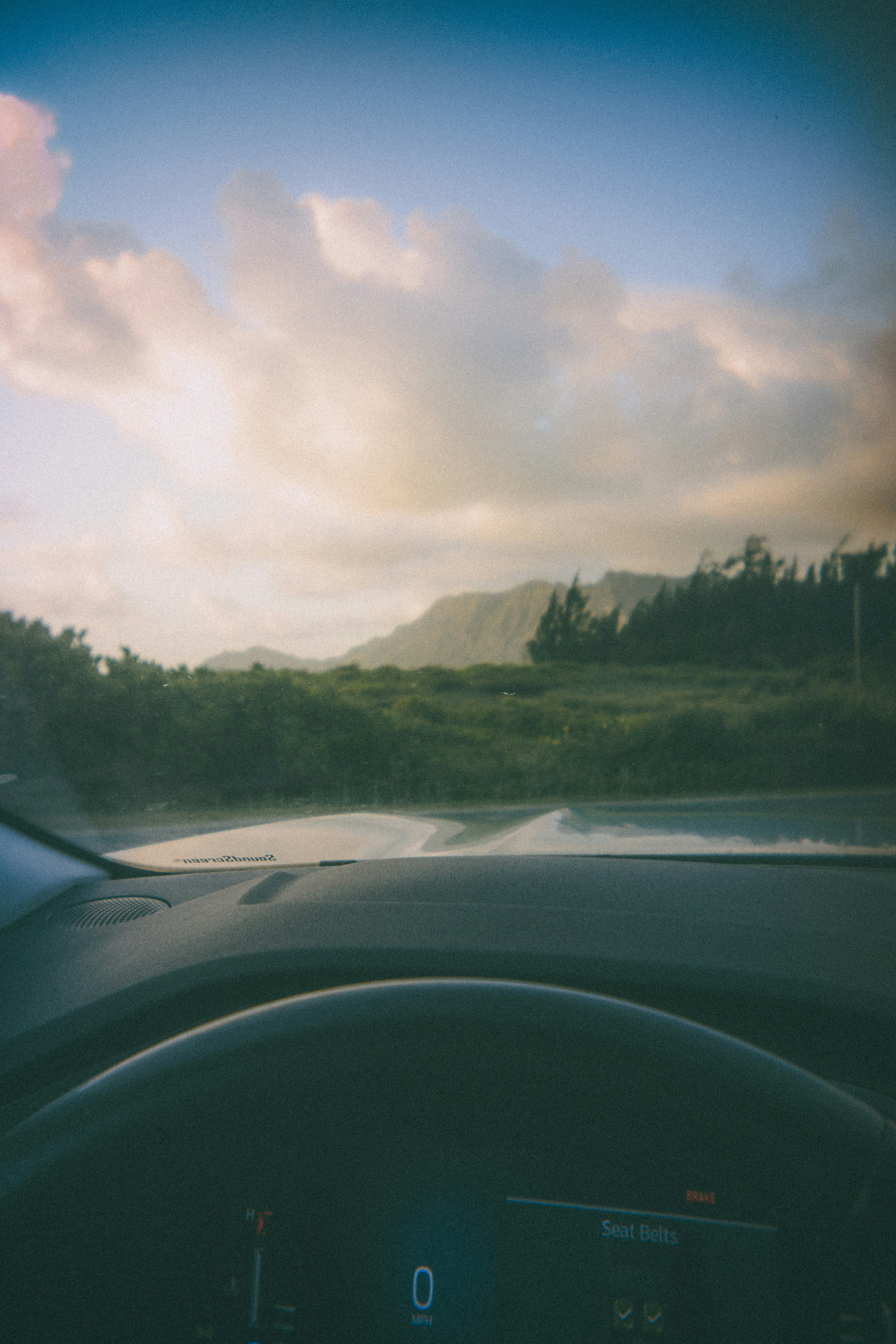 Dawn Drive: Mountain Vista Beyond the Car Dash