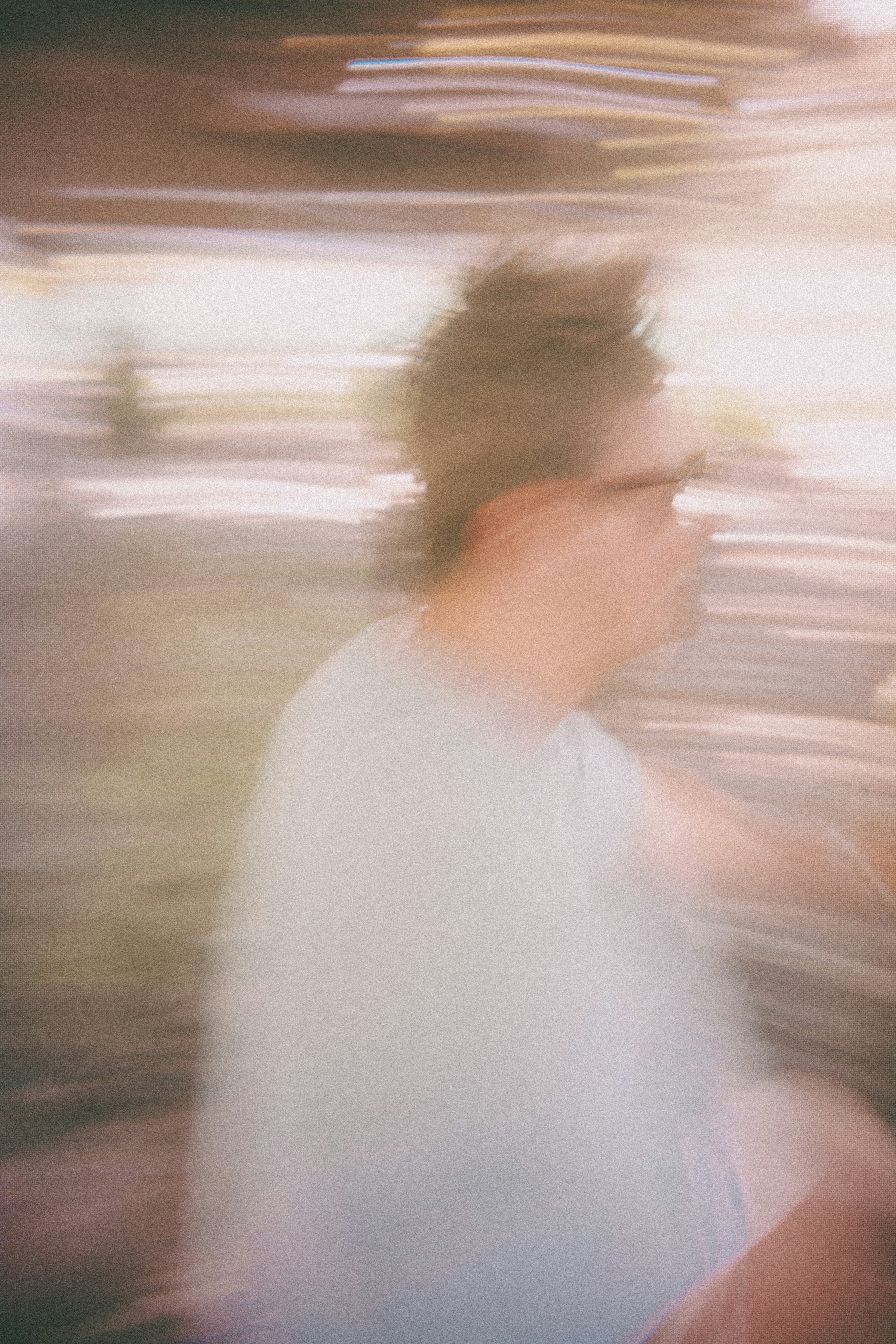 Motion Blur Portrait: A Soft-Focus Moment in Transit