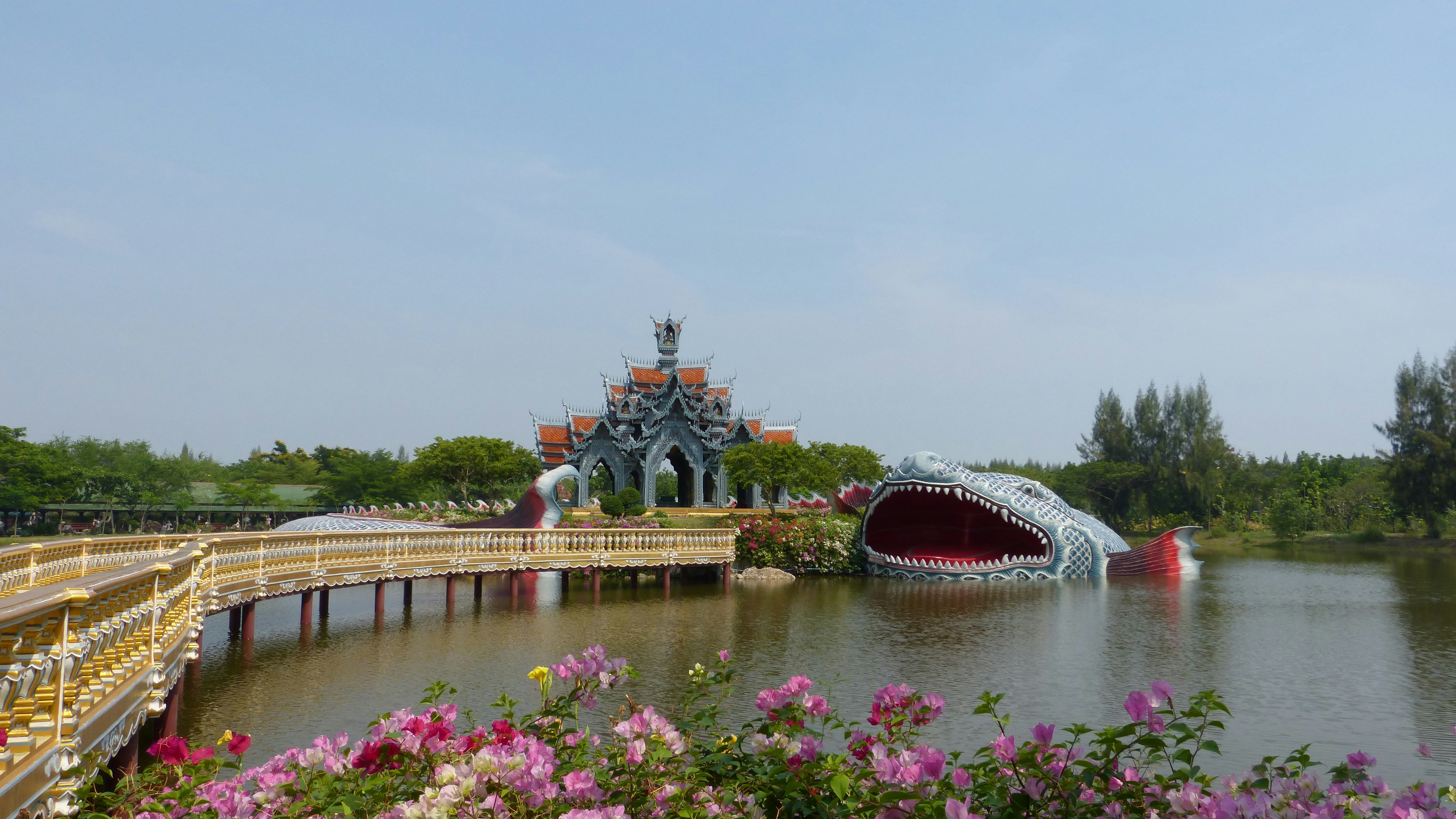Dragon-Bridge Over Calm Pond at a Decorative Park