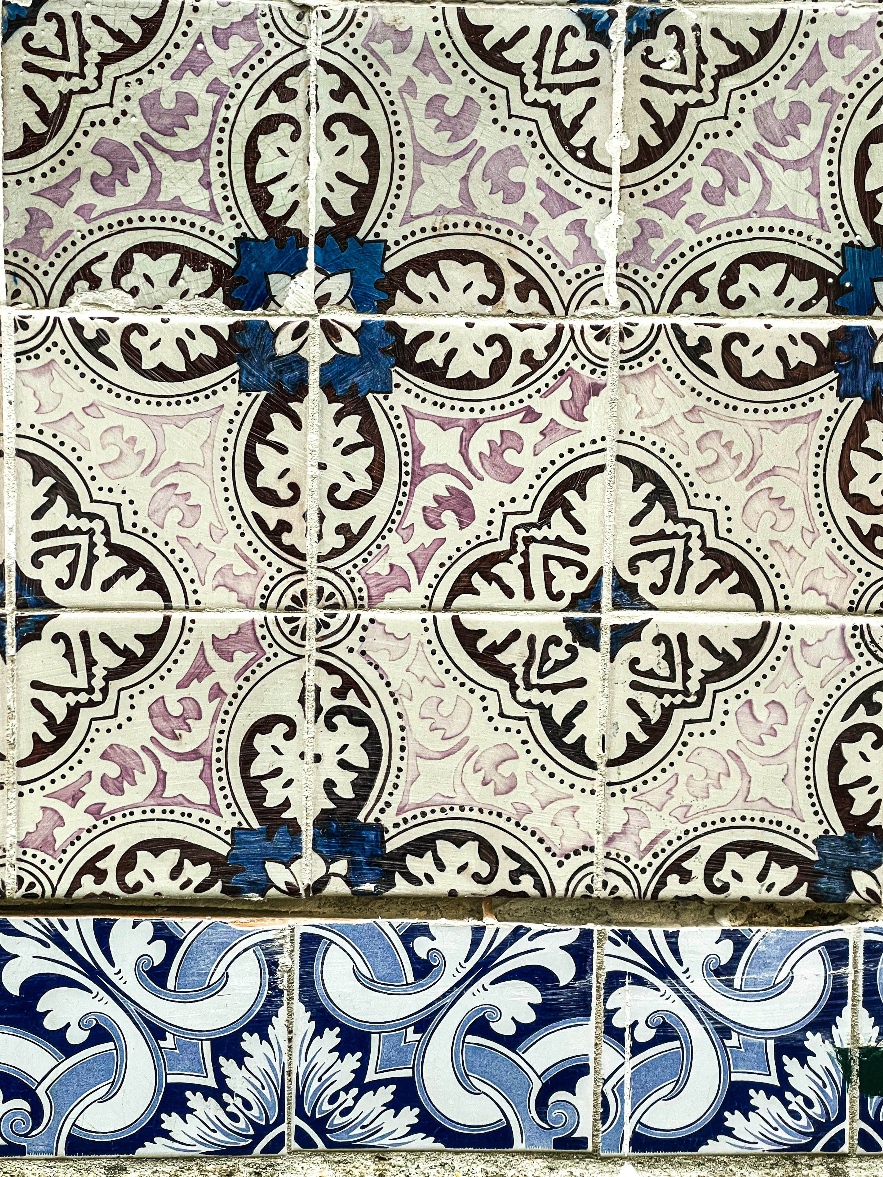 Decorative tiles with floral and geometric patterns.