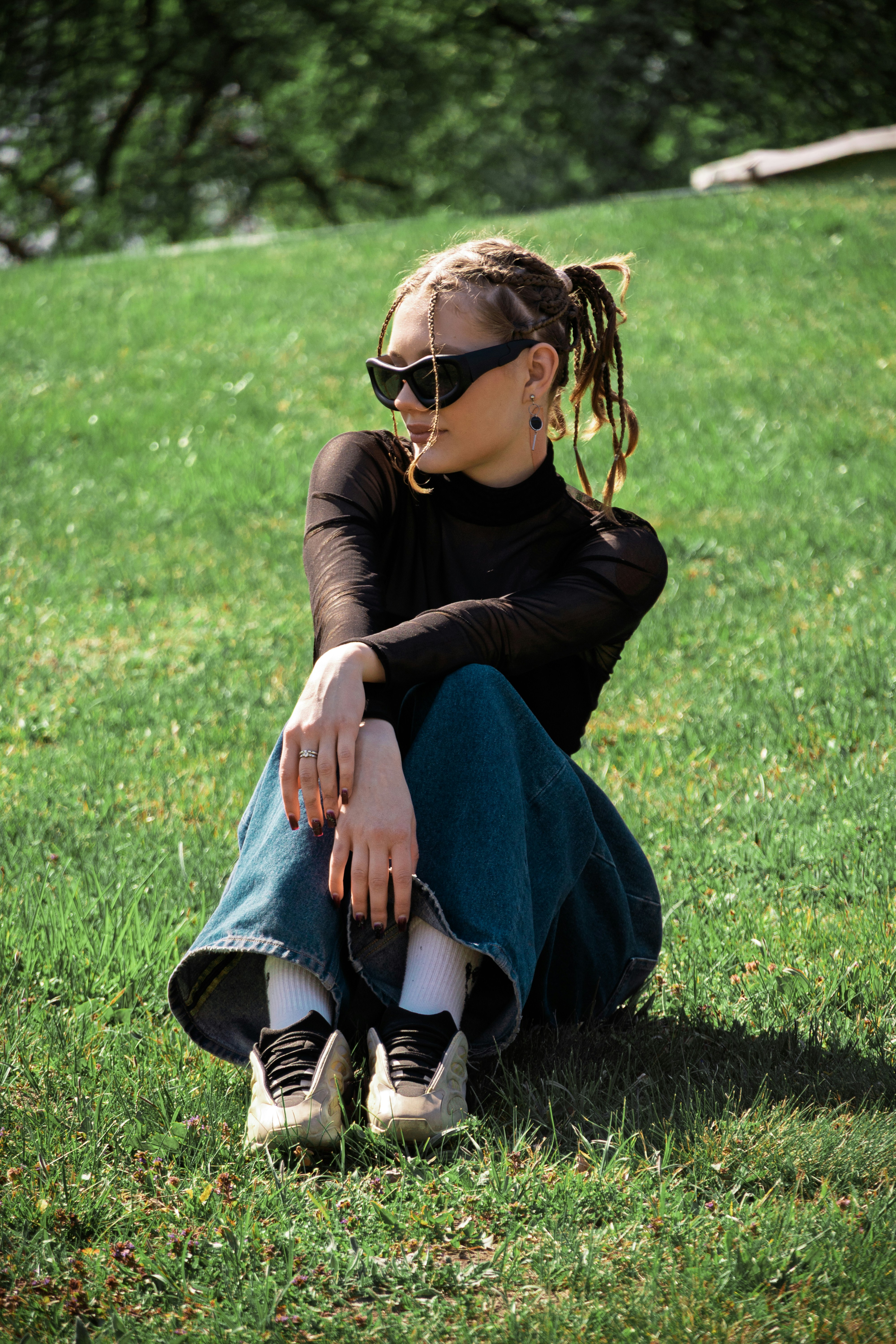Sundrenched repose: a sunlit portrait in a park