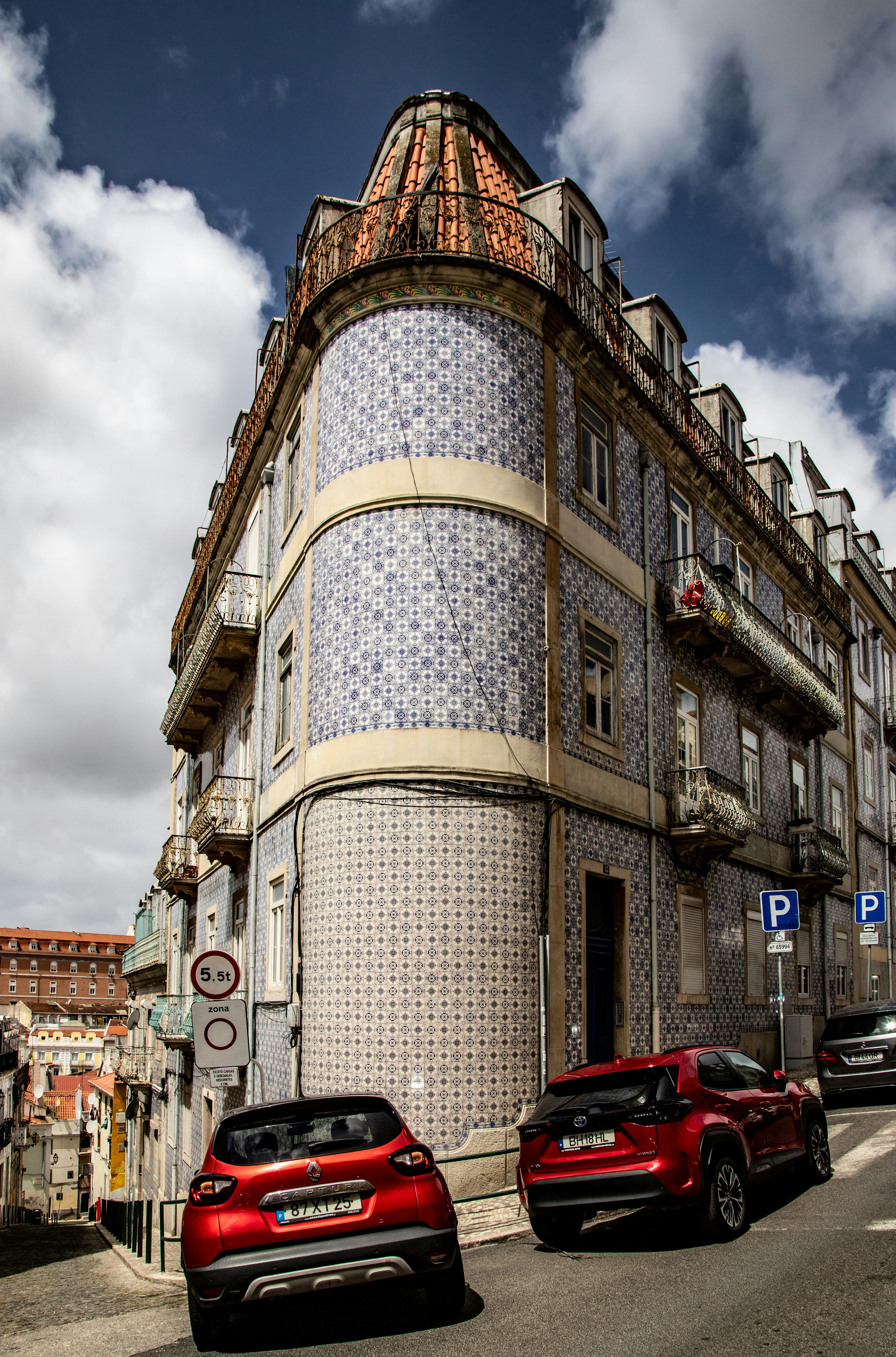 Tilework Tower: A Curved Facade Rises Above Lisbonian Street
