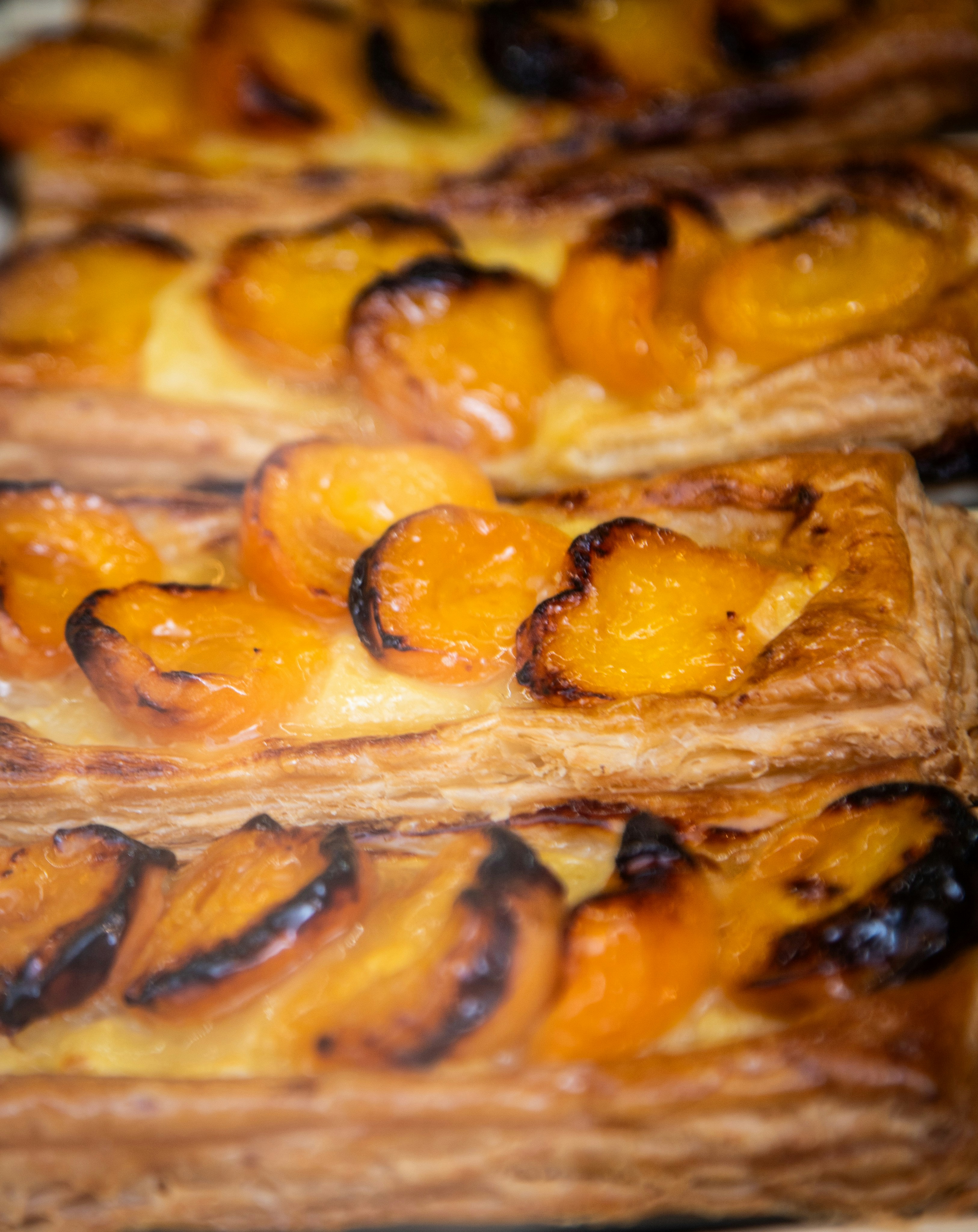 Sunlit Peach-topped Pastry Crescents