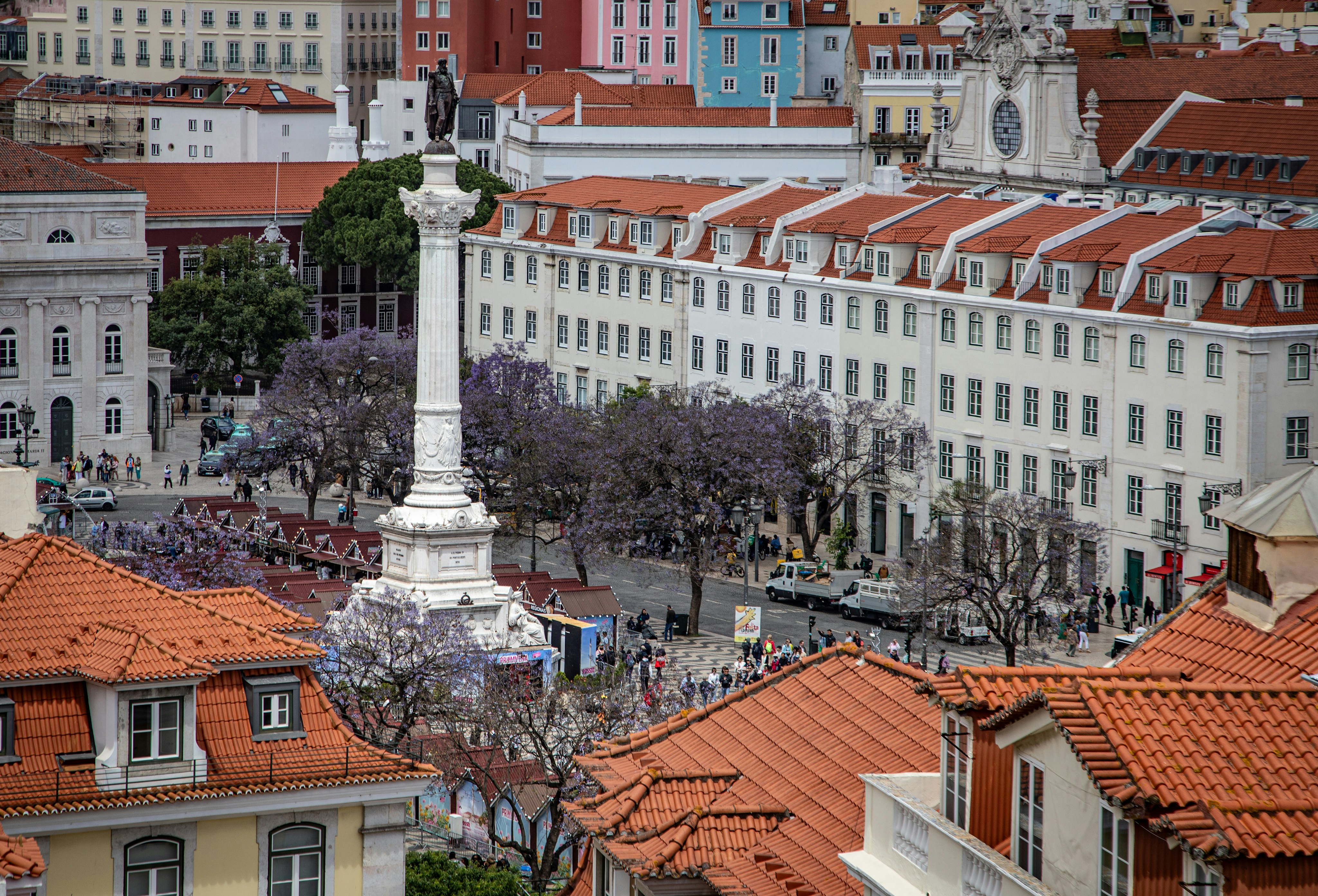 Colorful Lisbon Rooftops Framing a Central Monument