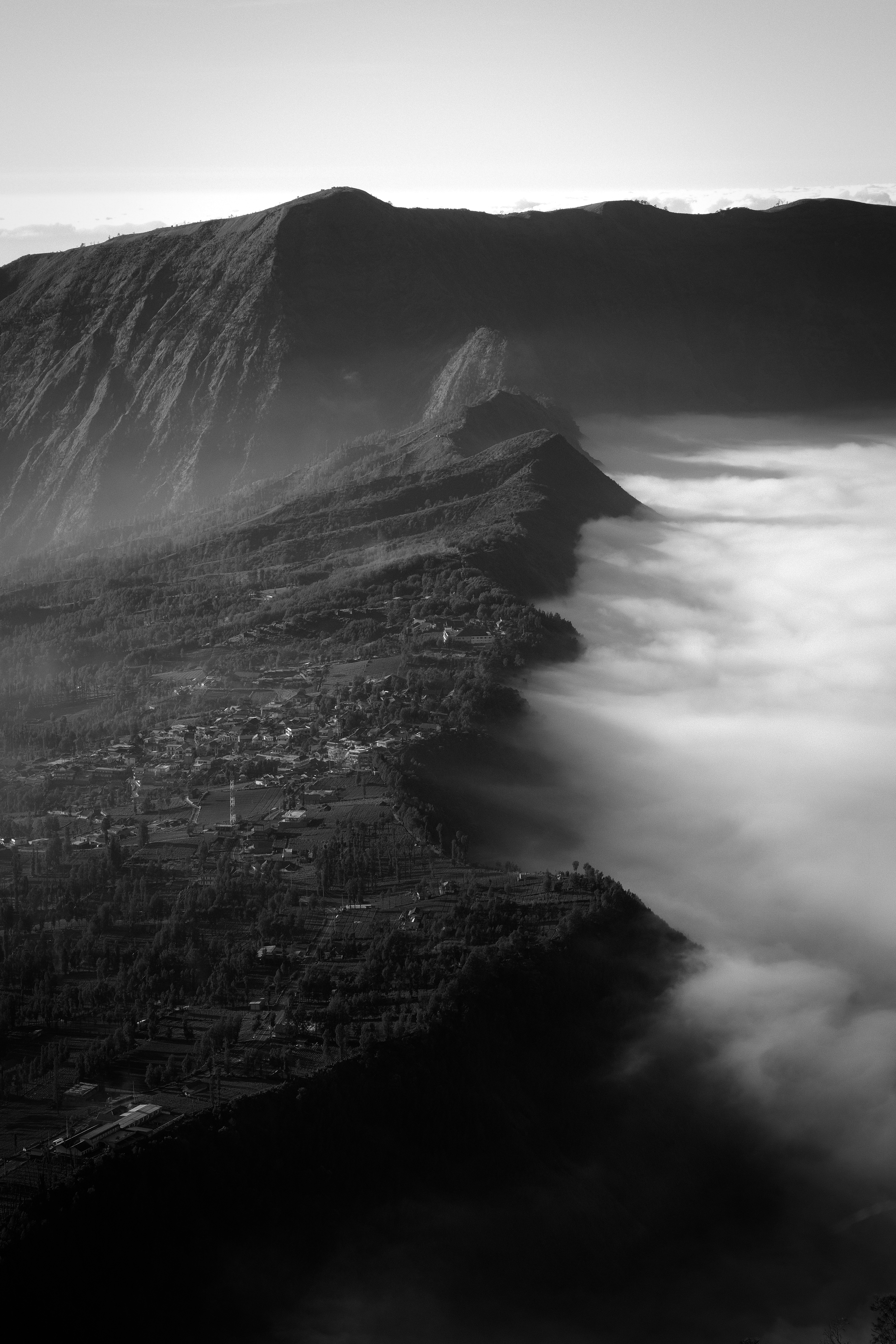 Misty Ridge: A Monochrome Climb Above the Cloudsea