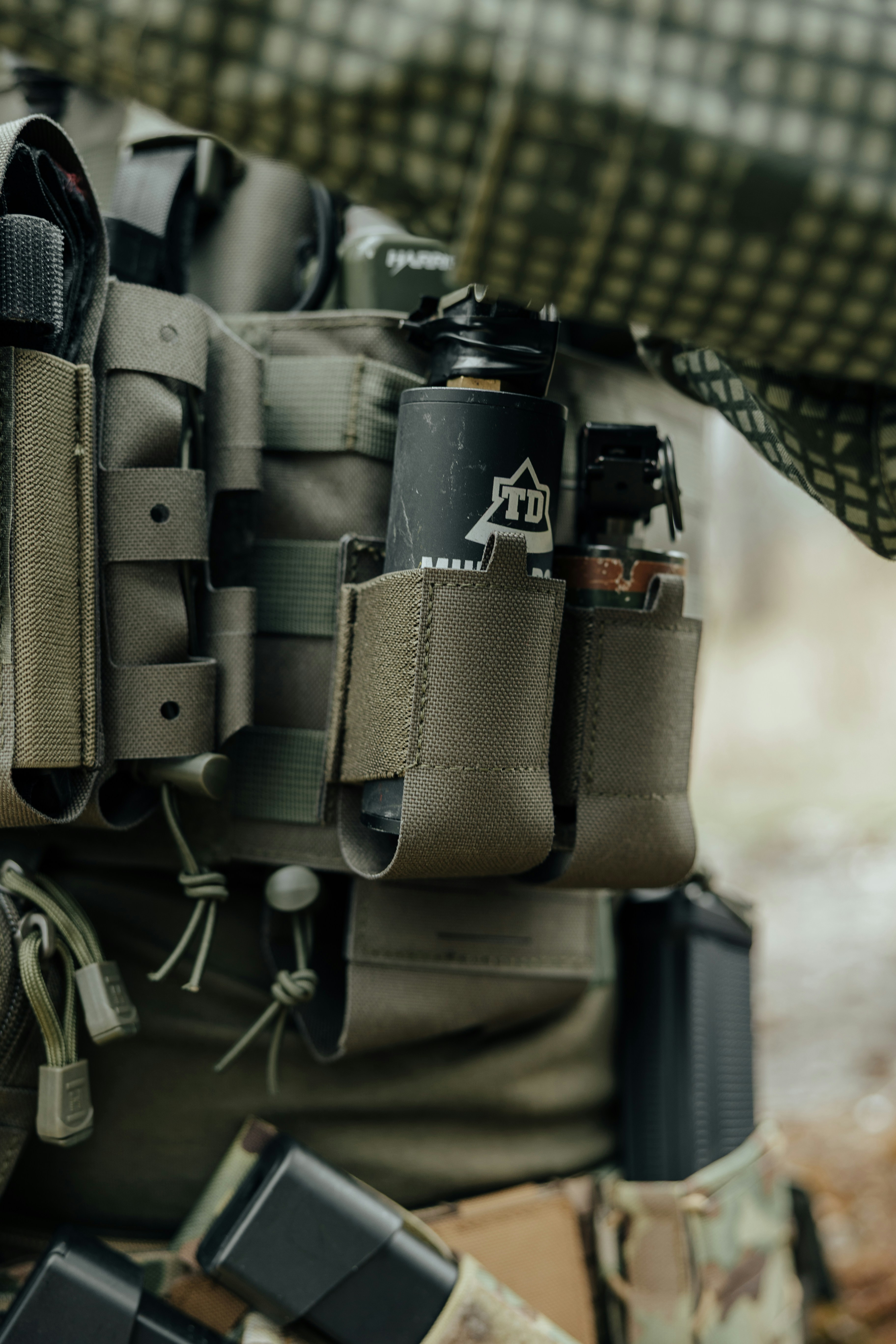 Close-Quarter Field Kit: A Tactical Vest with Compartments and Gear
