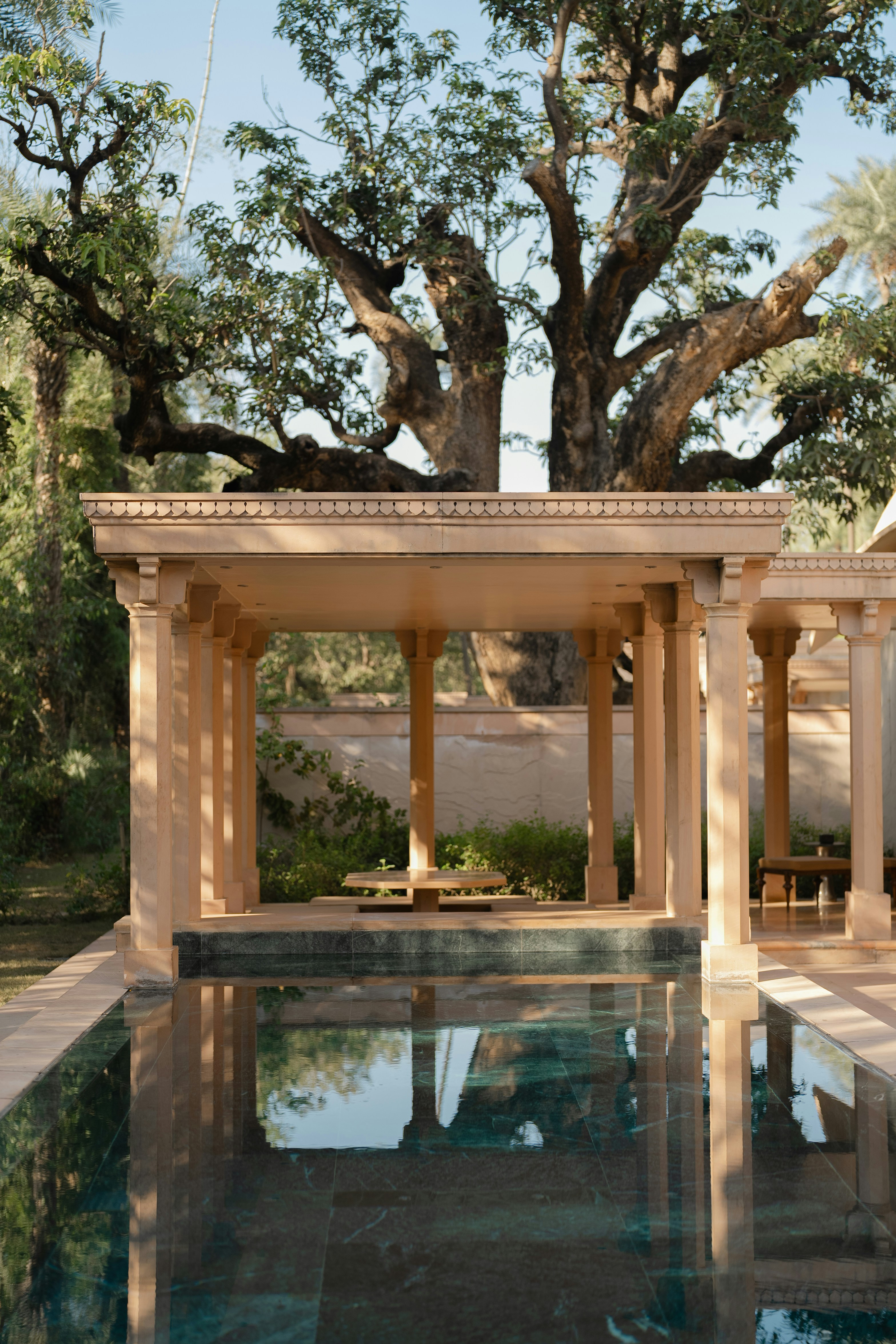 Sunlit Peristyle Over a Mirror Pool