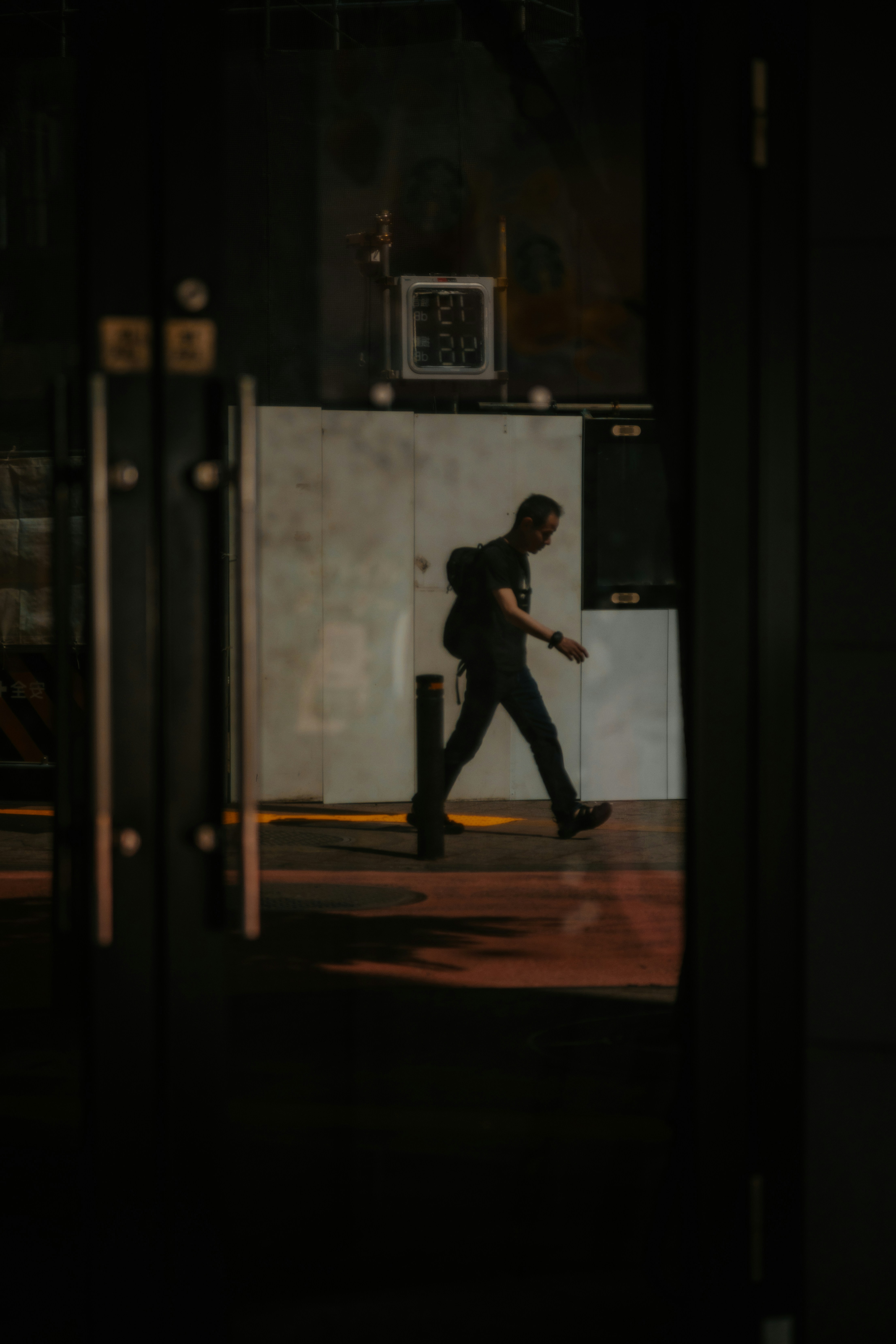A Quiet Stride Through the Glass Corridor