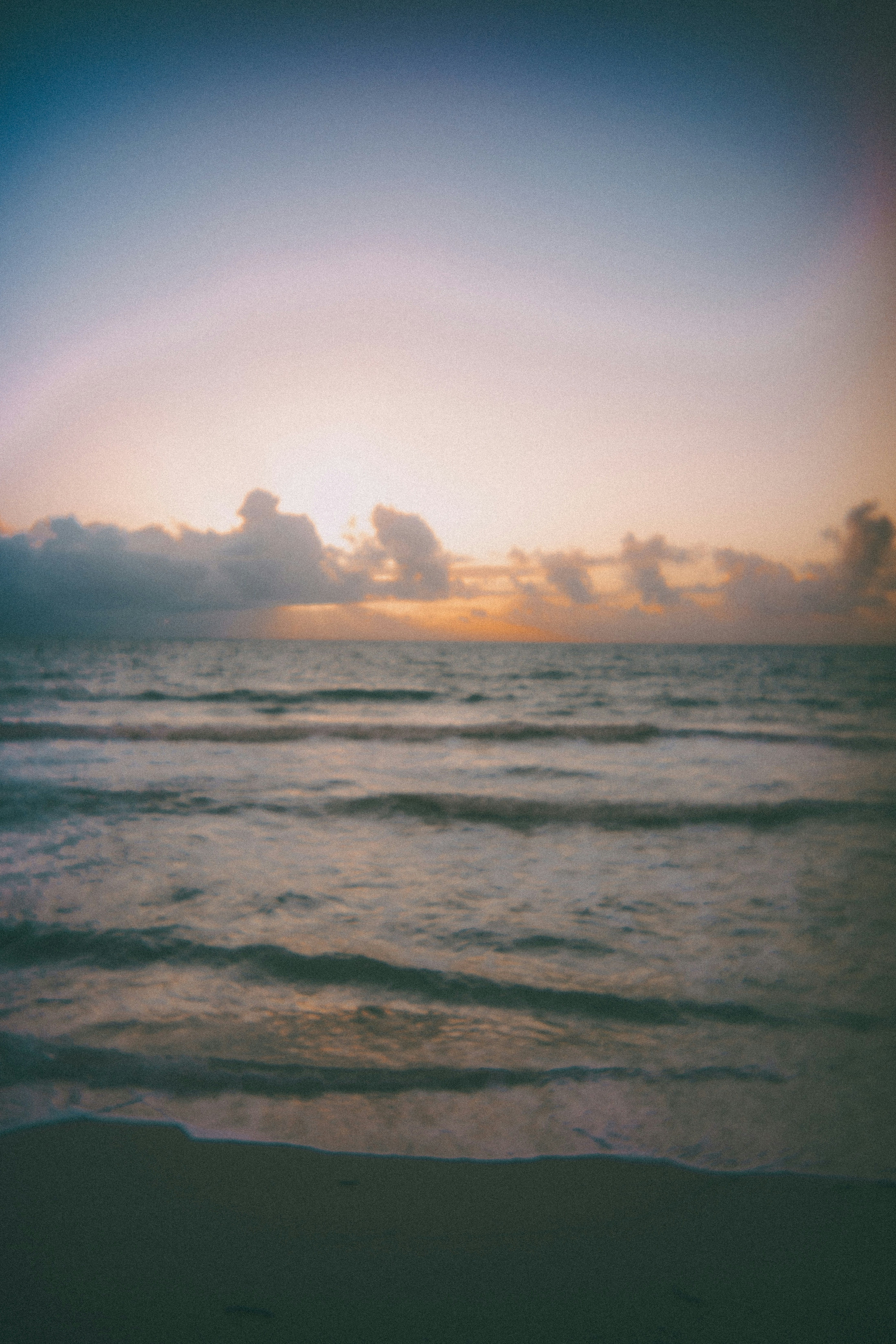 Dusk Over Quiet Tides: A Softly Blurred Seascape