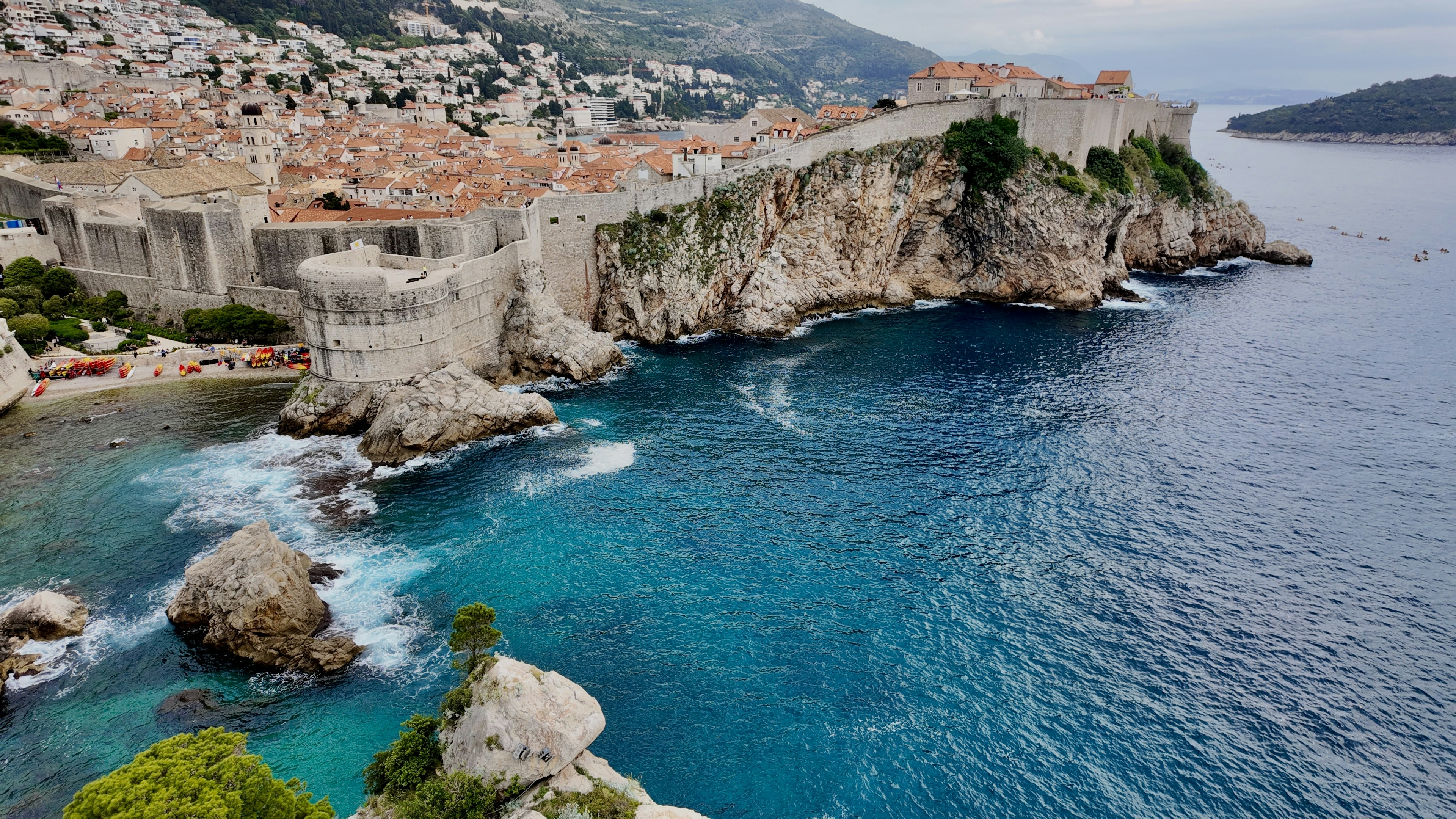 Fortified Cliffside Town Over Blue Adriatic Waters