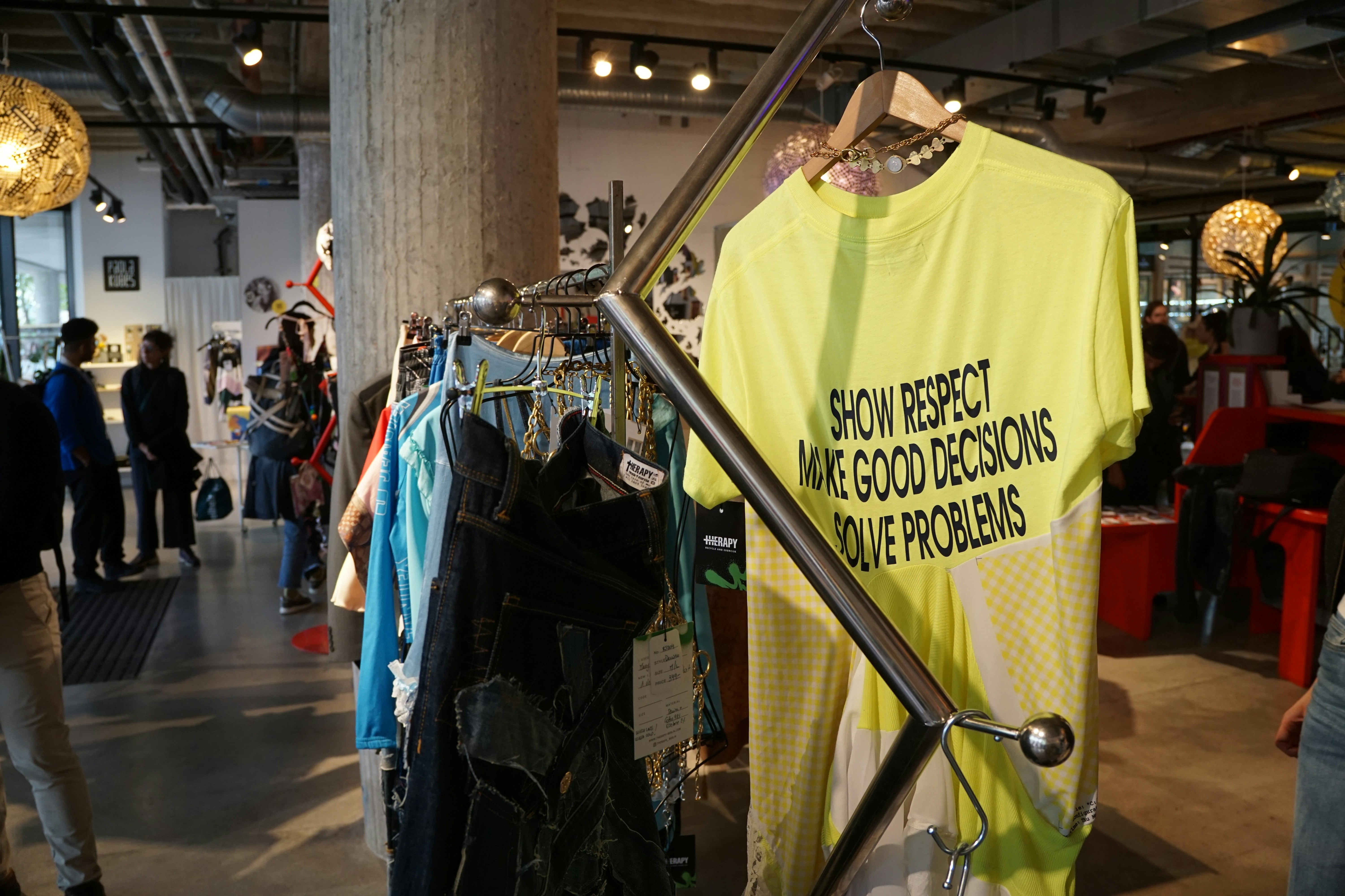 Neon Yellow Tee on a Kinetic Display in a Fashion Studio