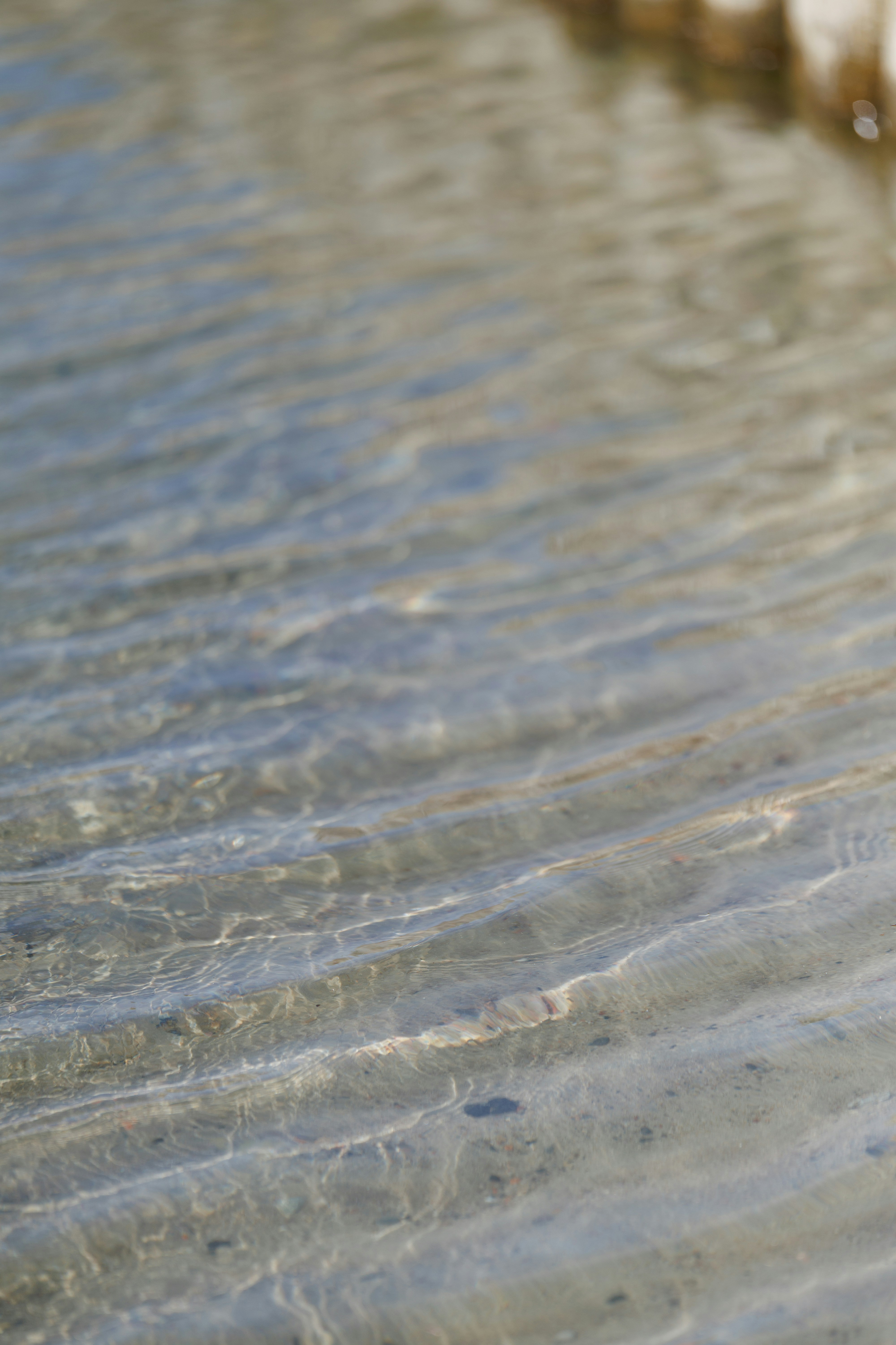 Rippled Shoreline: Quiet Currents Across Shimmering Sand