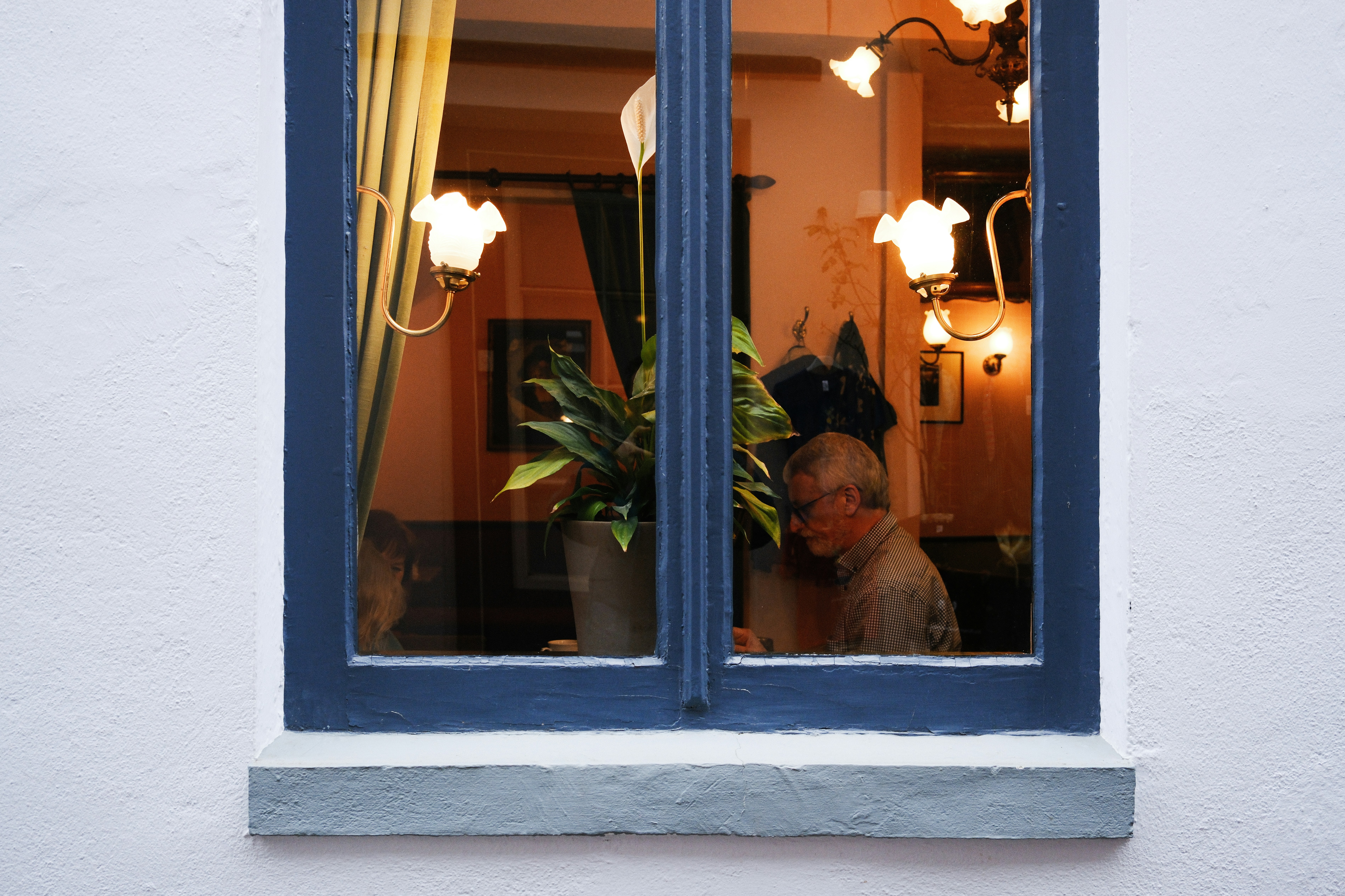 Quiet Interior Through a Café Window