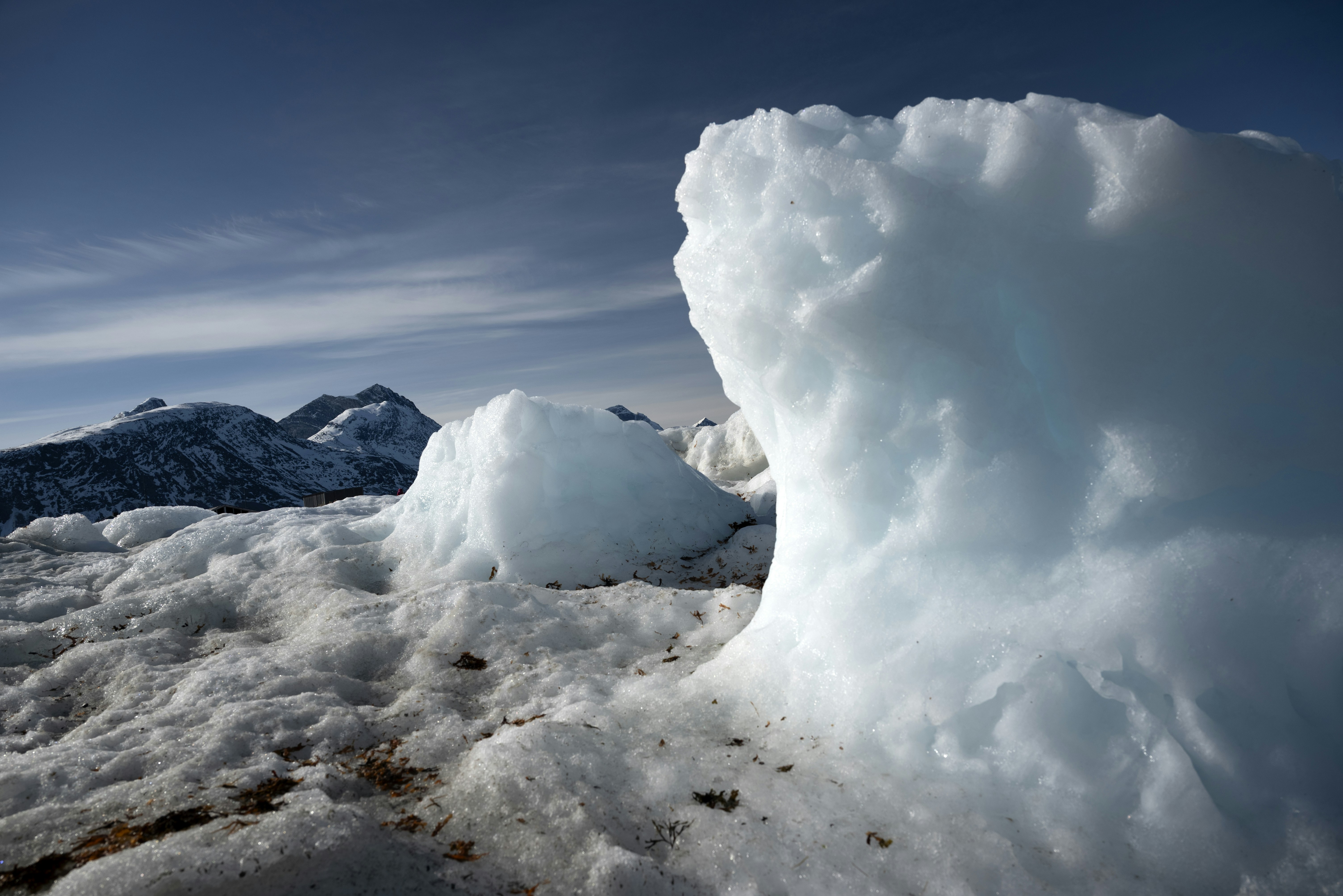 Ice Sentinel: A Glacial Crest Meeting the Sky