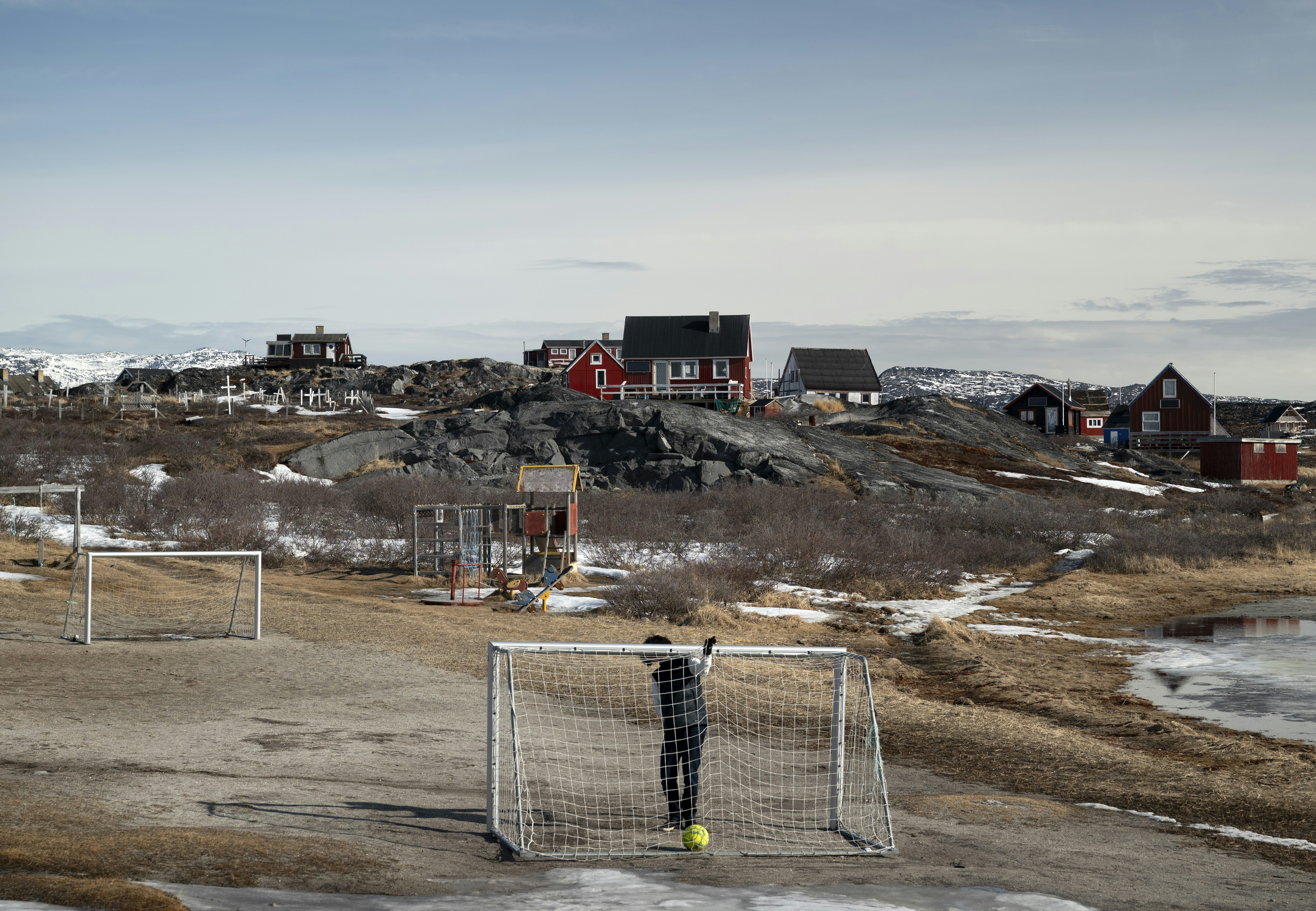 Foothold of Winter: A Quiet Soccer Moment in a Rugged Coastal Hamlet