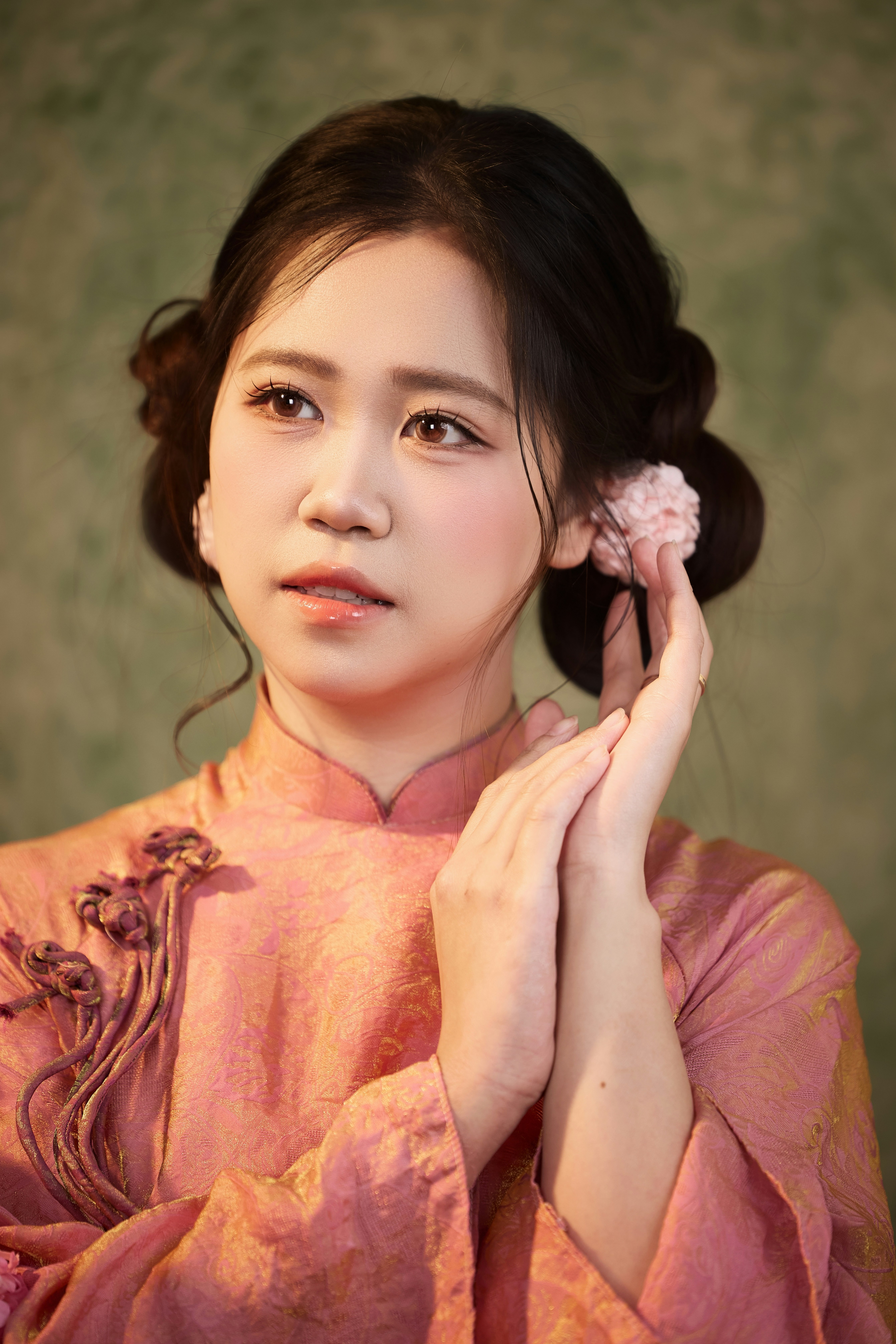 Ear Ornament in Soft Pink Silk: A Quiet Portrait
