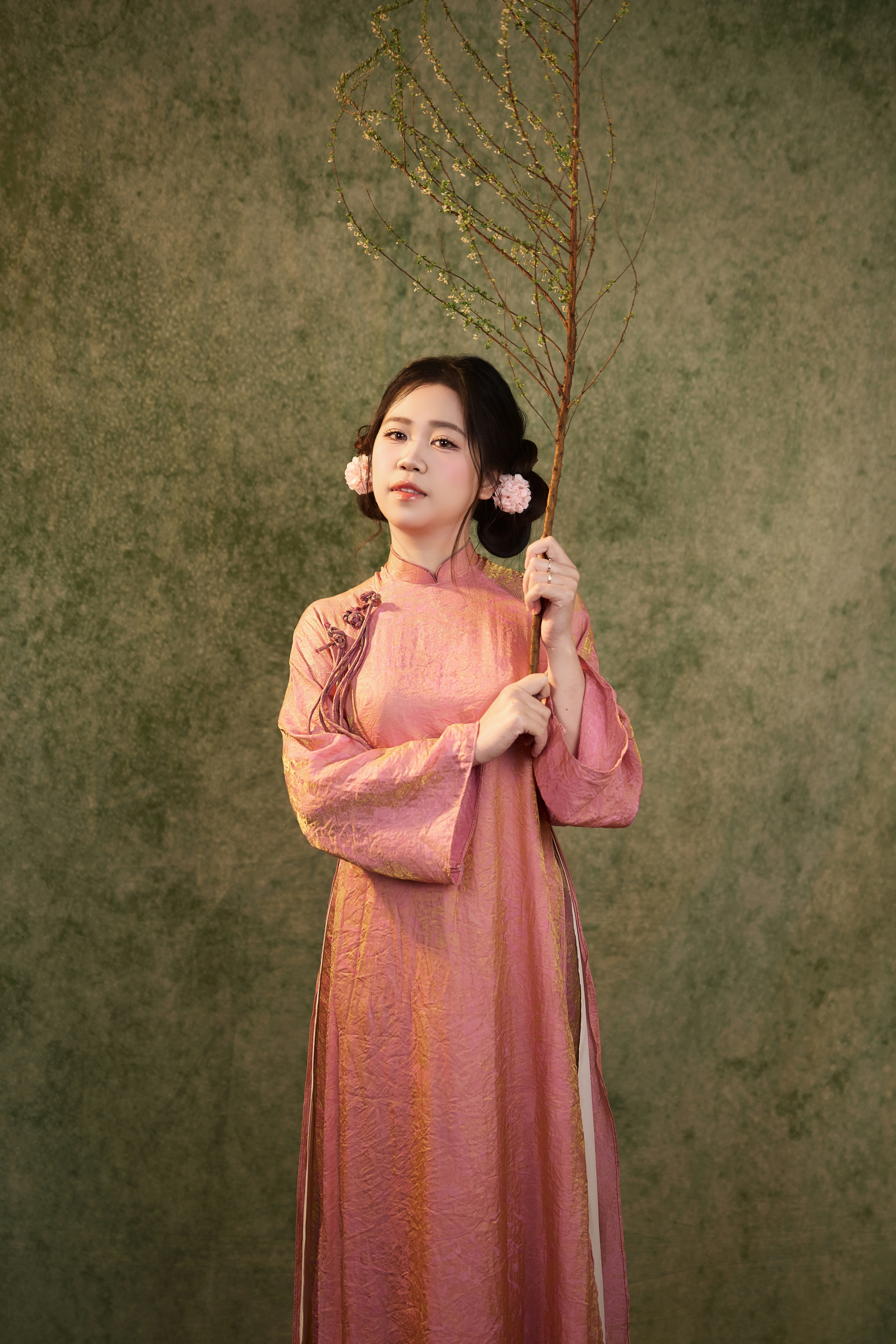 Soft-petal Grace: A Portrait in Pink Kimono Holding a Willow
