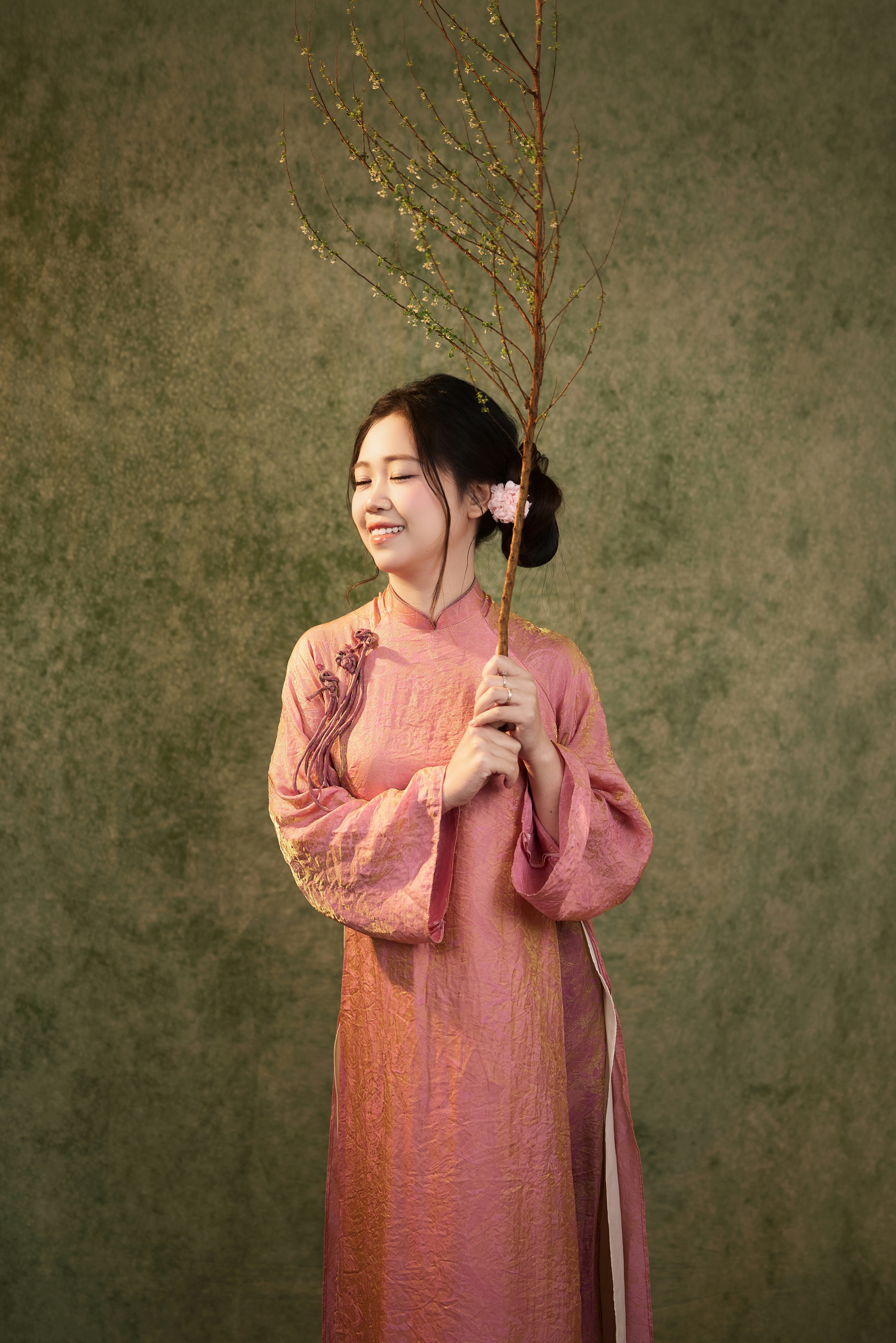 Gentle Poise with Branches: a Portrait of Quiet Grace