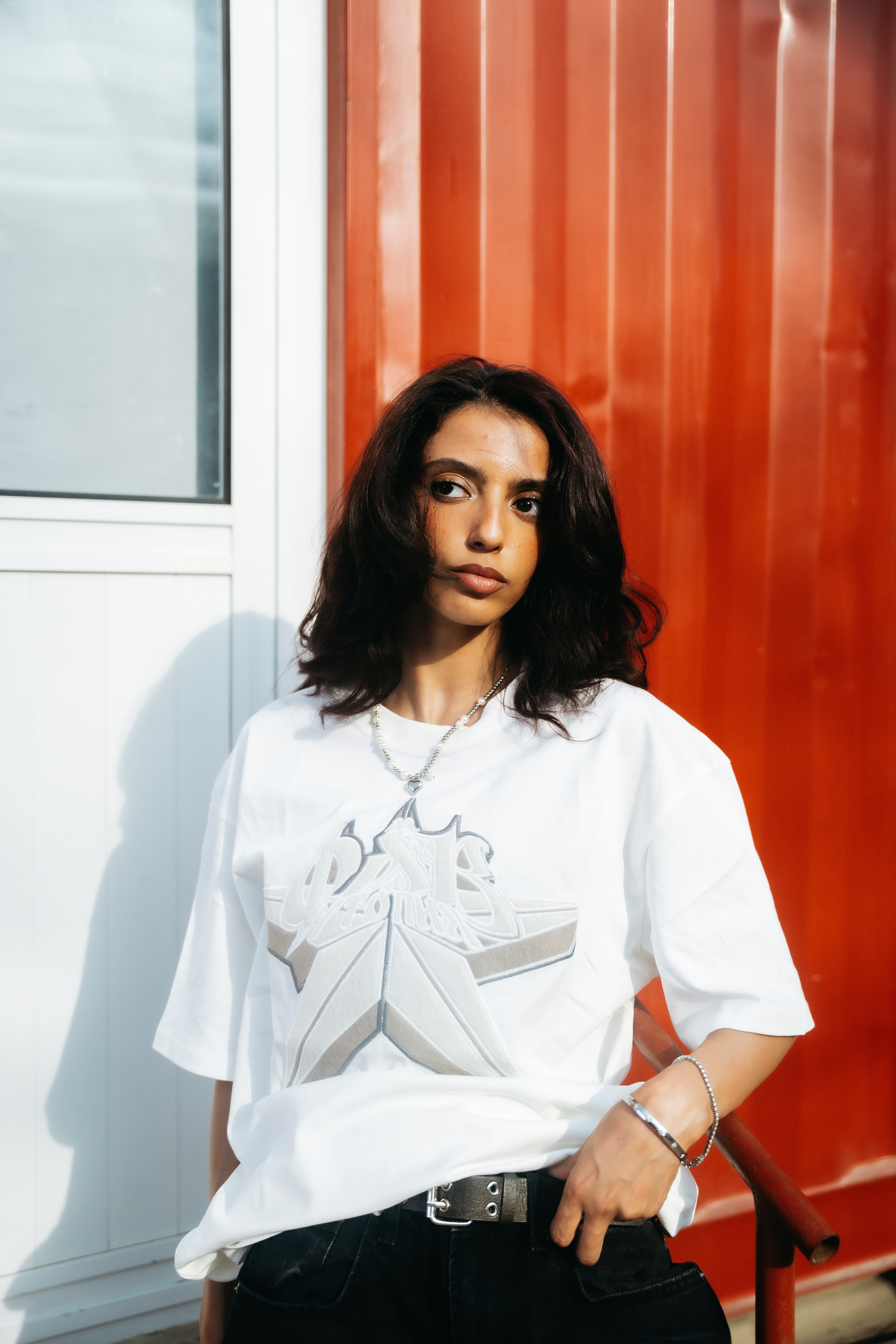 Against the Orange Canvas: Portrait in White