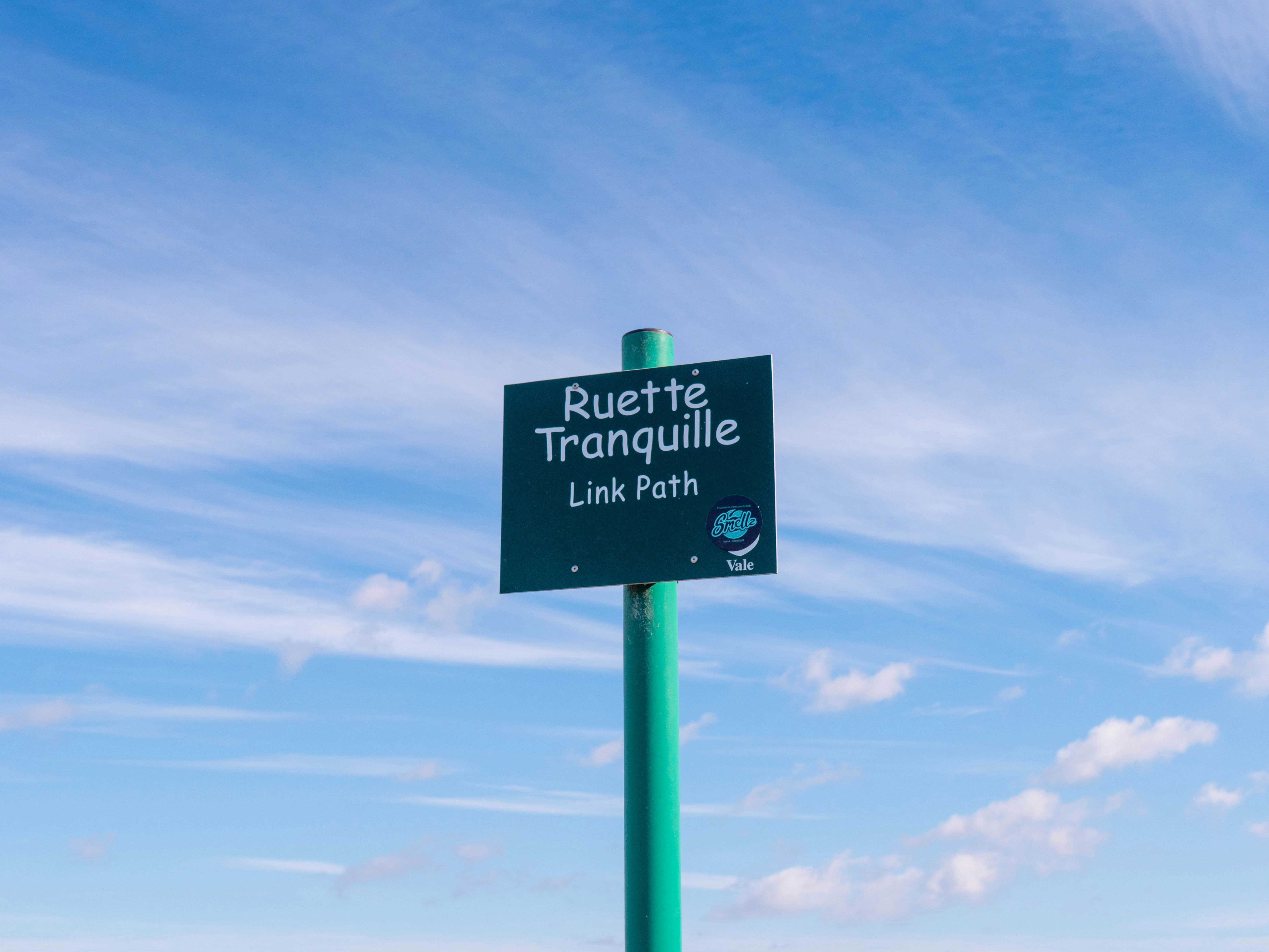 Quiet Path Signpost in a Blue Sky Moment