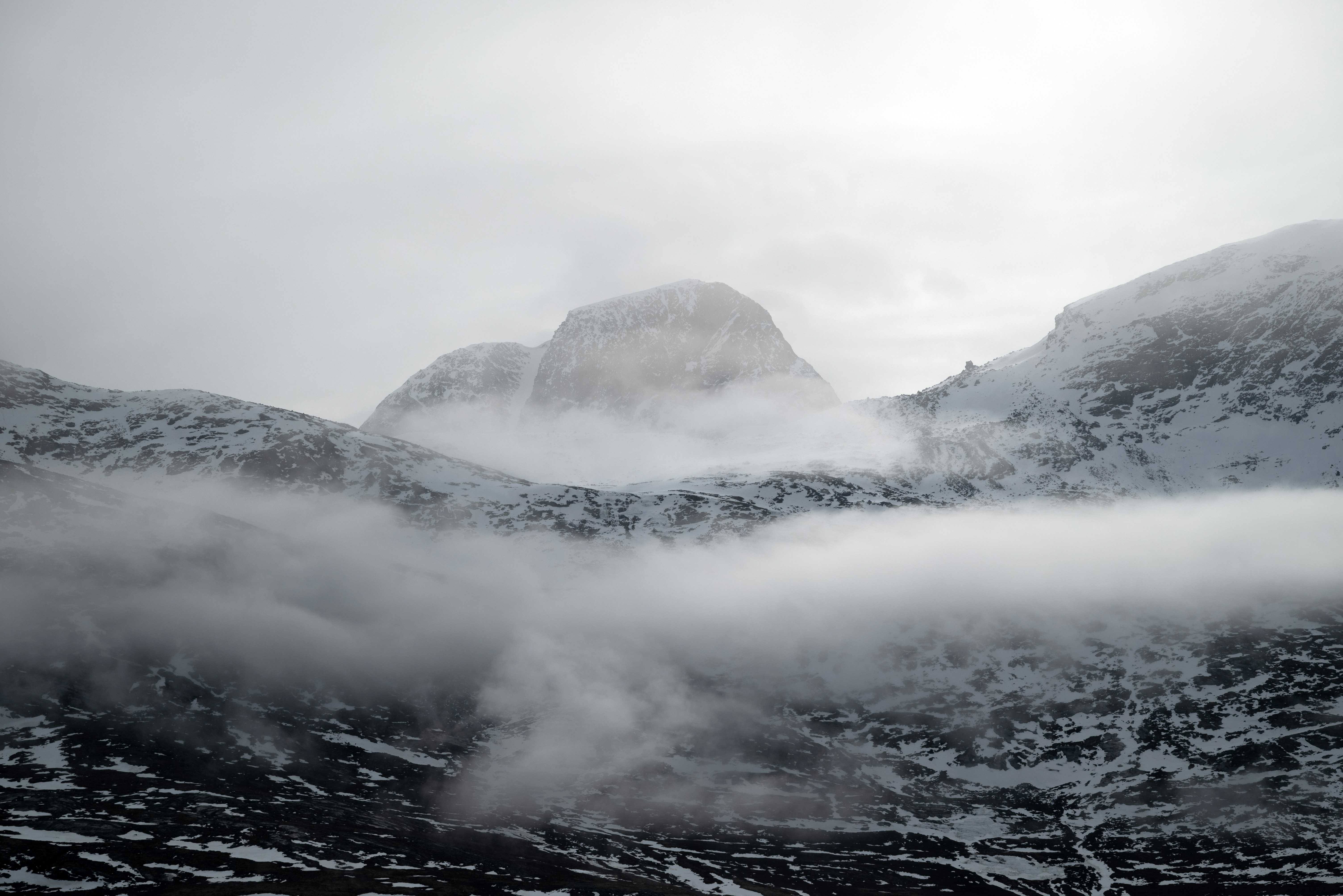 Mist-Locked Summit: A Quiet Ridge Rising Through Veiled Clouds
