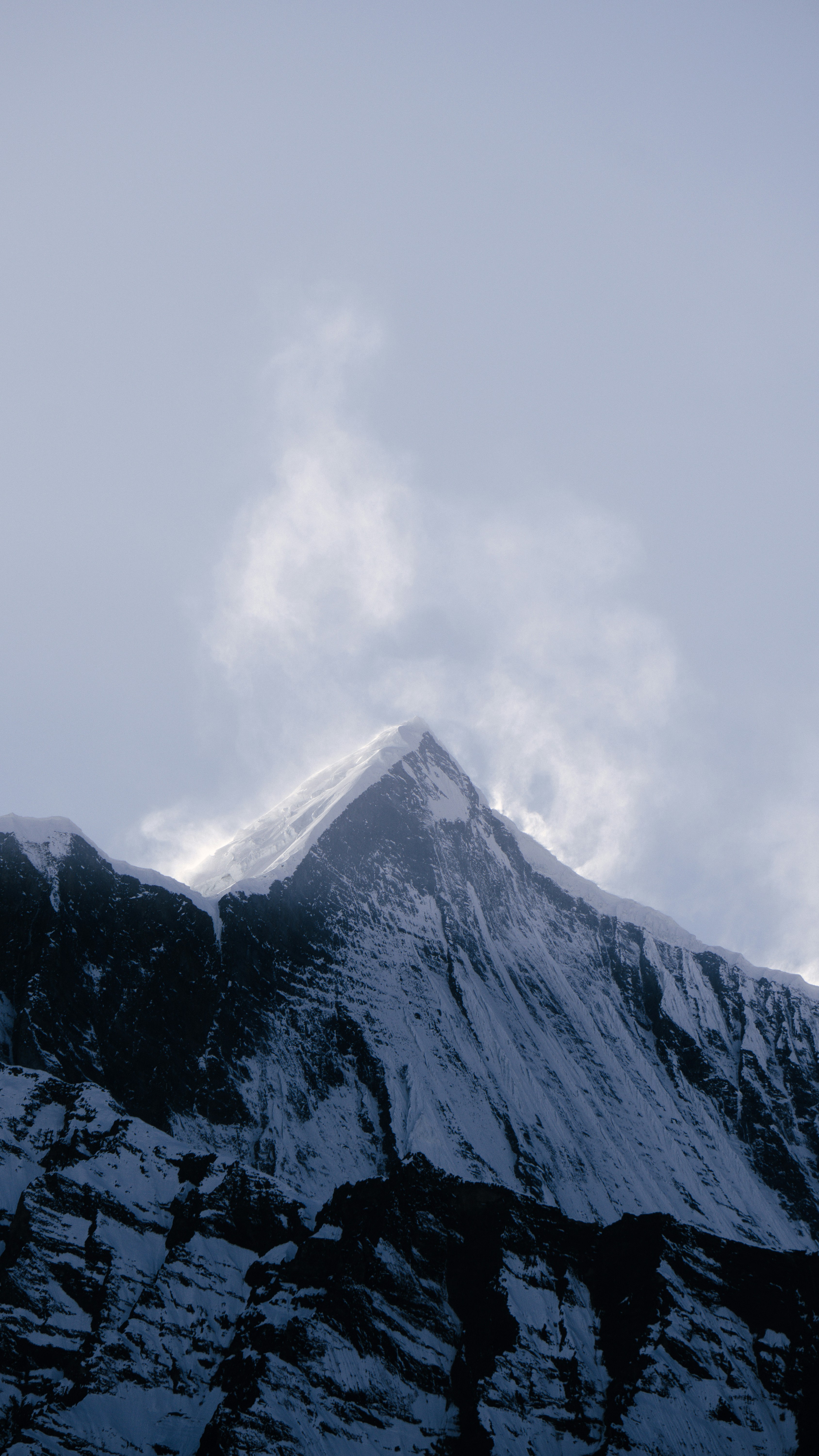 Peak Crowned by Wind-Whitened Summit
