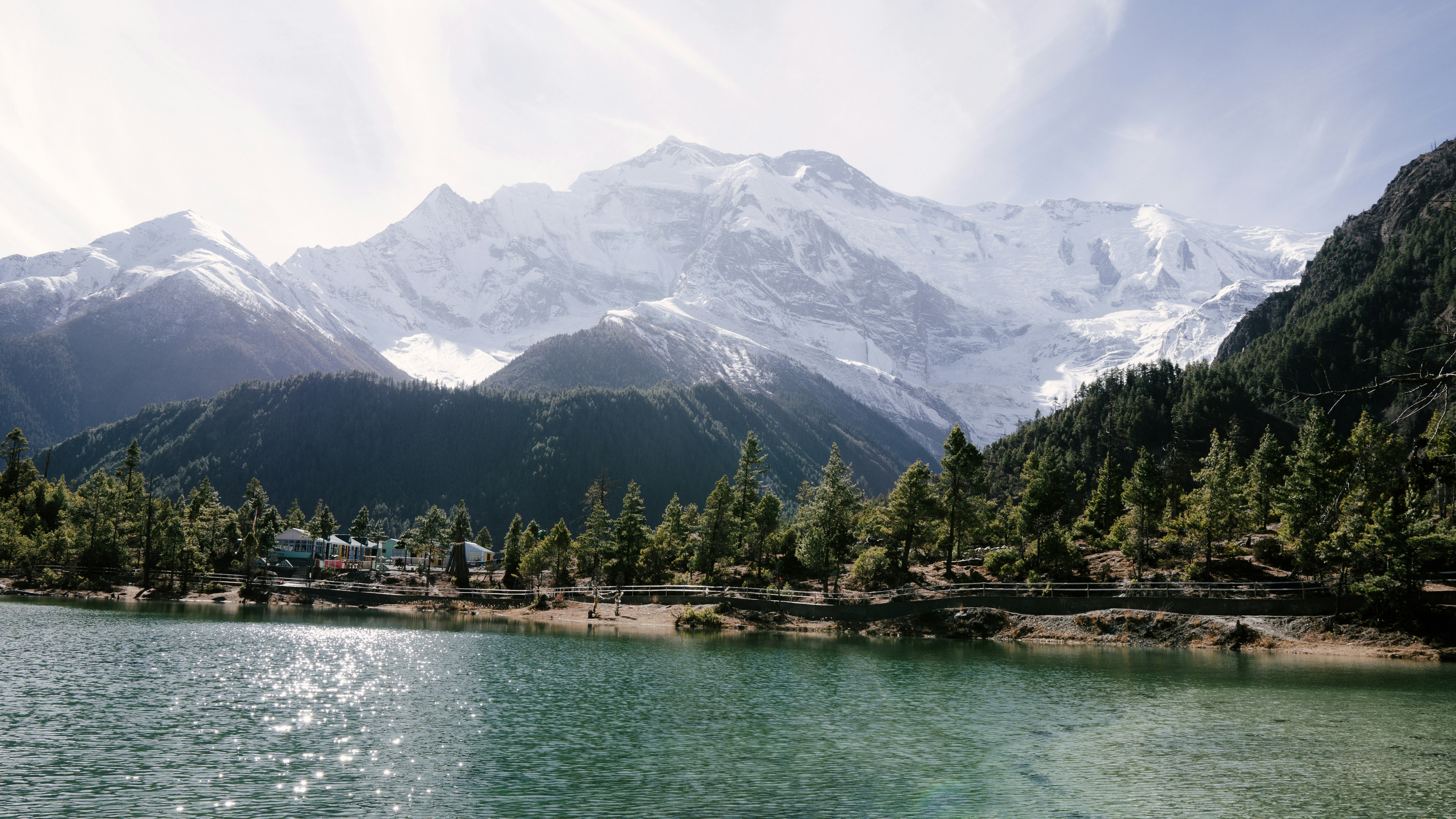 Glacial Crest Beyond the Forested Lake