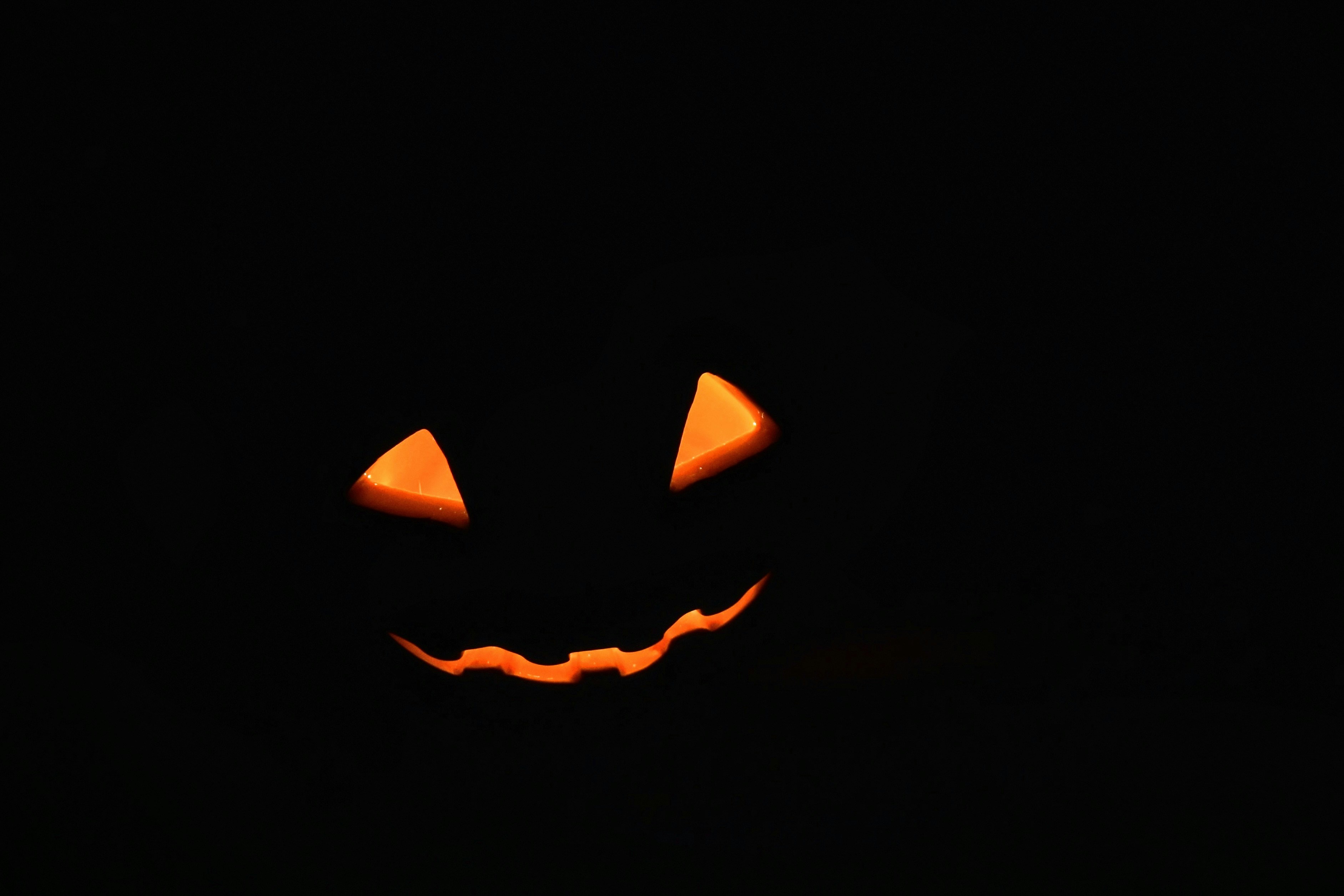 Hidden in Darkness: Glowing Pumpkin Grin