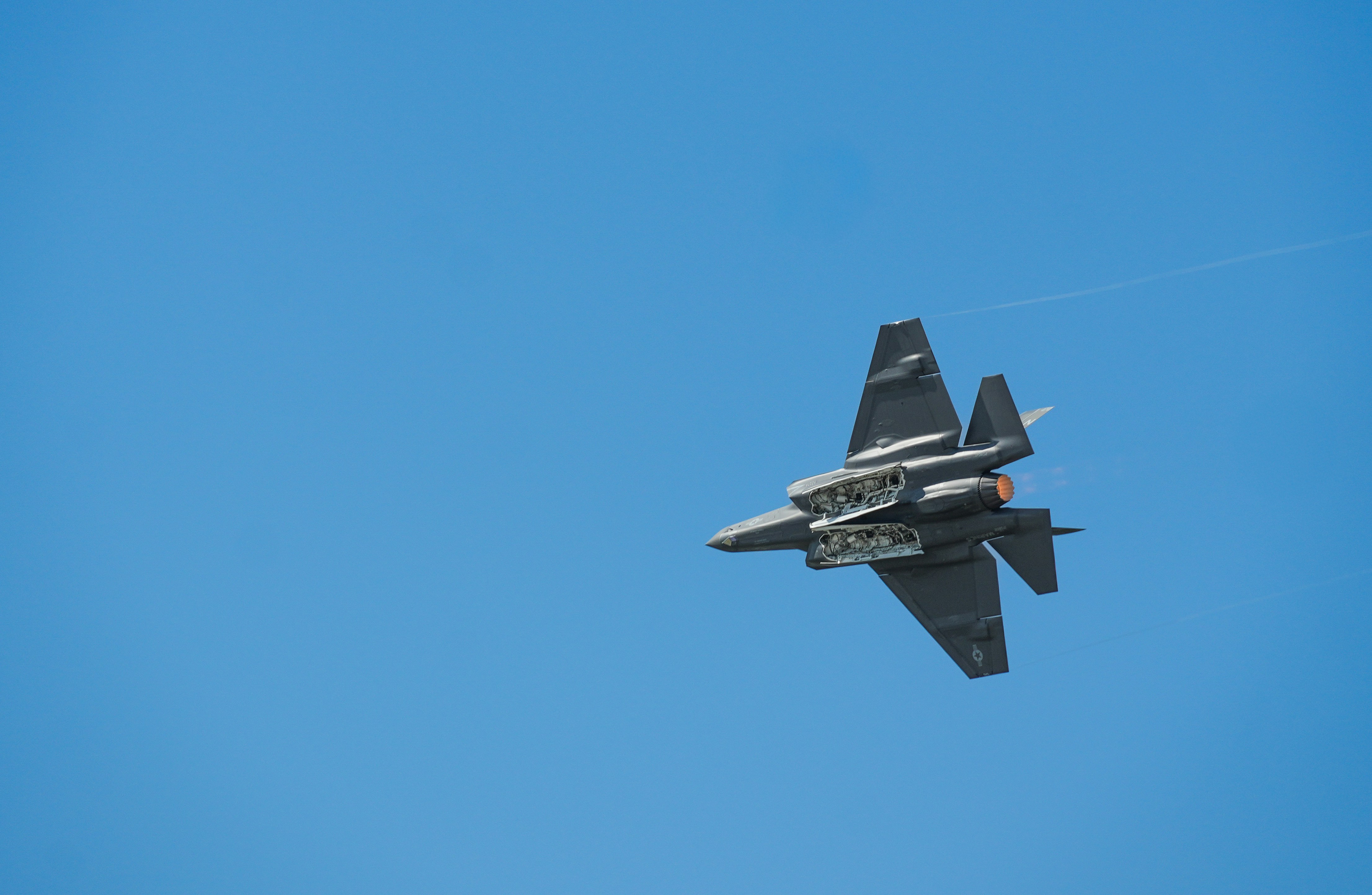 Skybound Shadow: A Stealth Jet Pierces the Blue