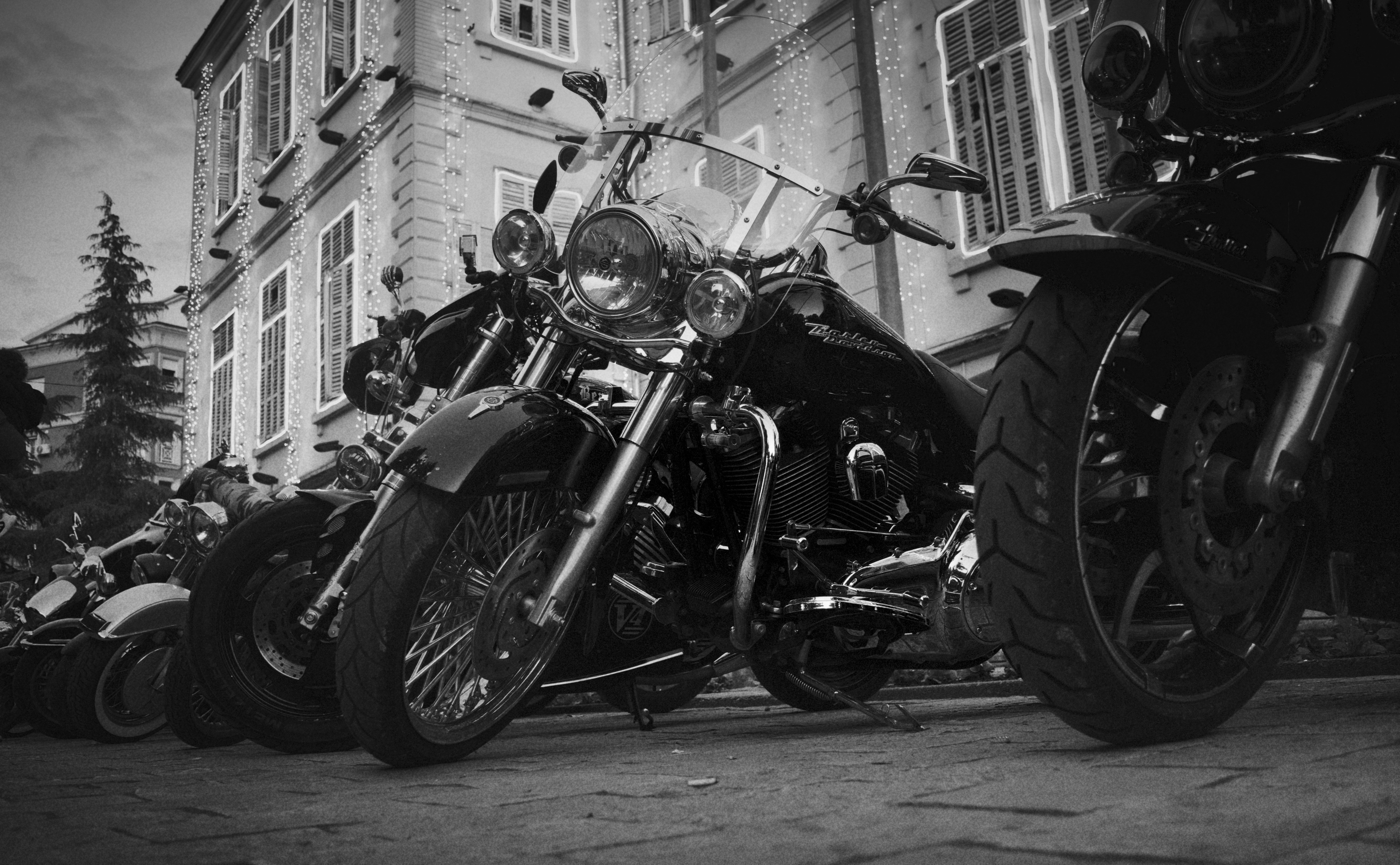 Midnight Parade: A Row of Classic Motorcycles Standing Guard