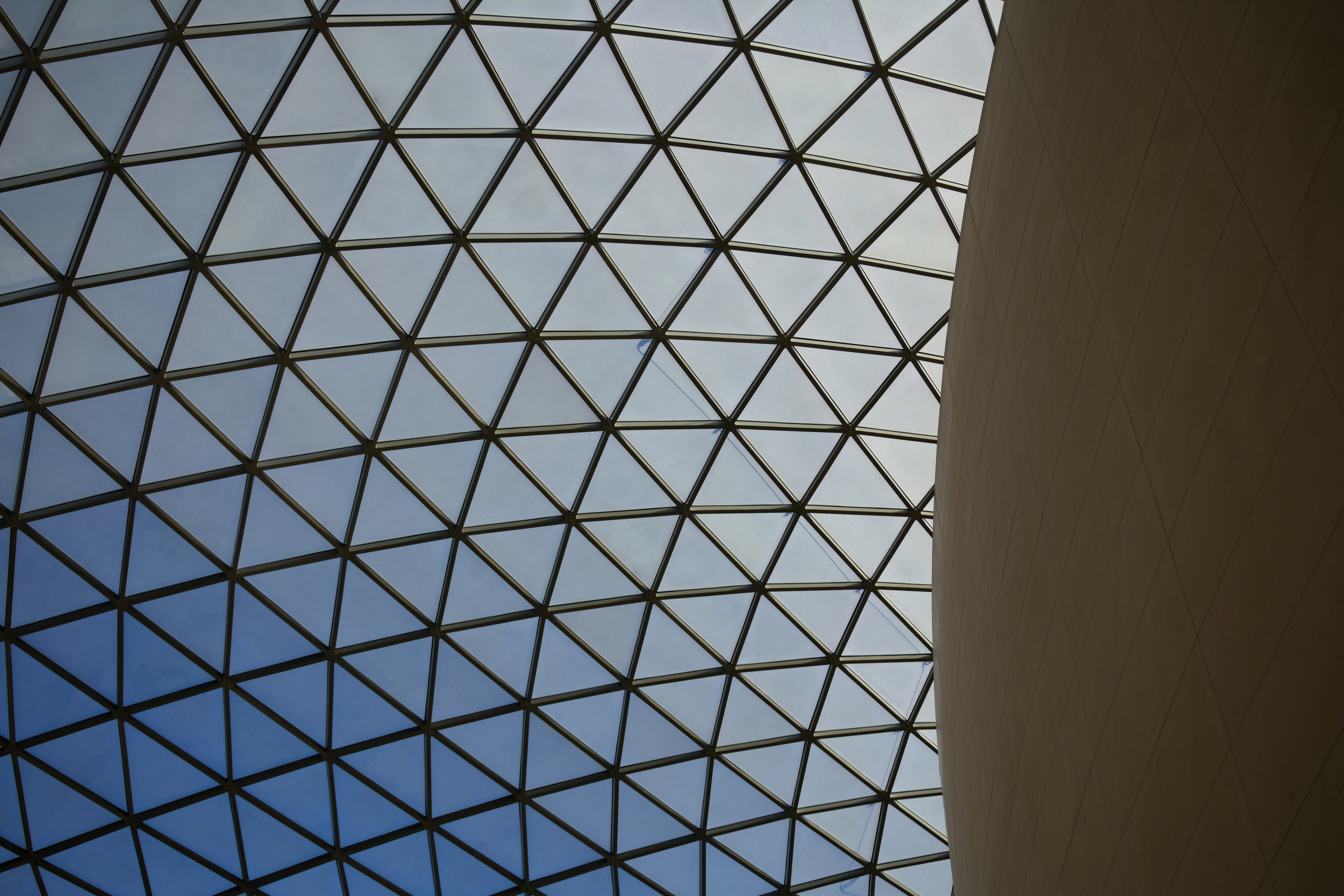 Crystal Grid Under Skies: A Geometric Canopy of Light and Shadow