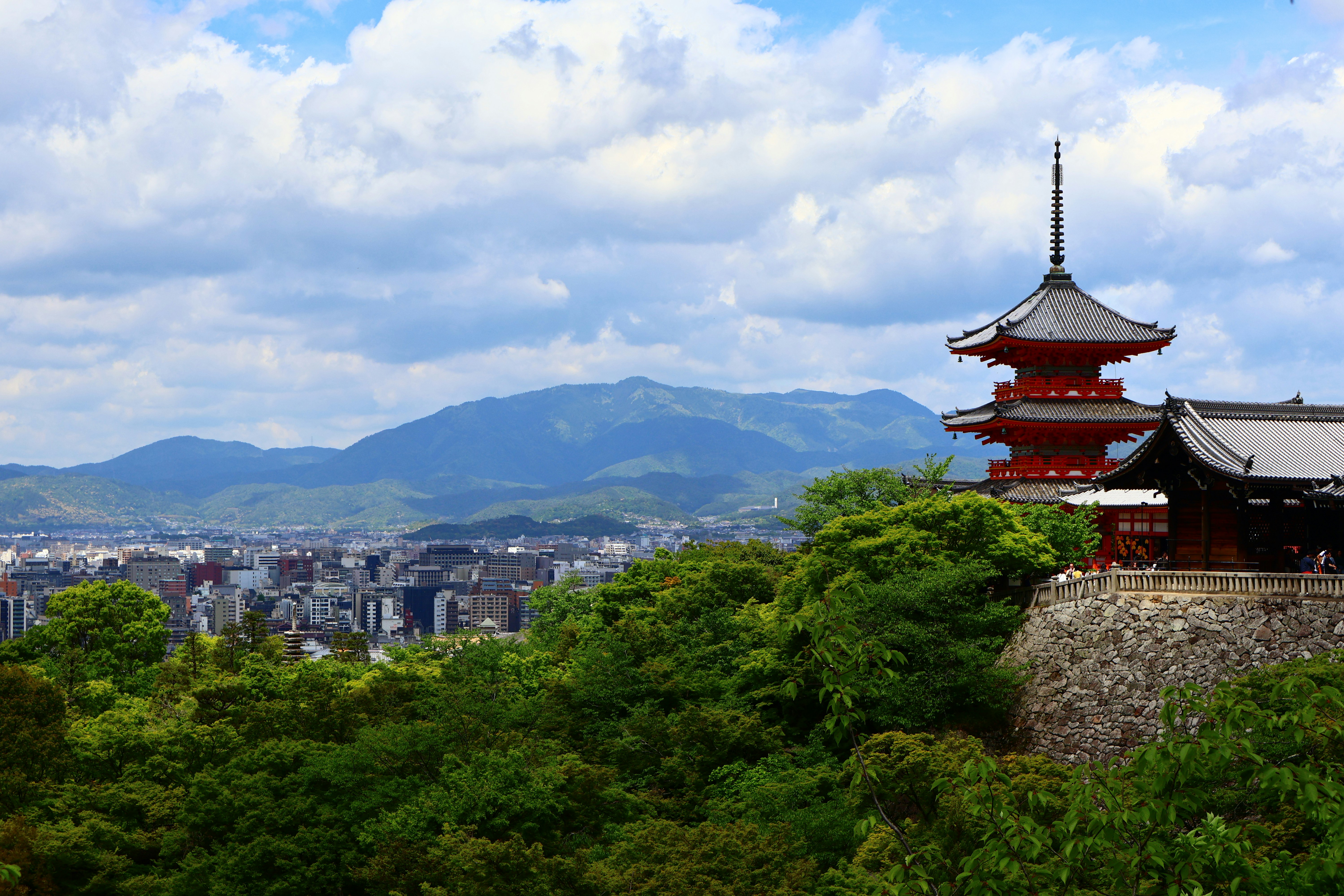 Pagoda Overlooking Kyoto: A City of Green Hills and Historic Rails