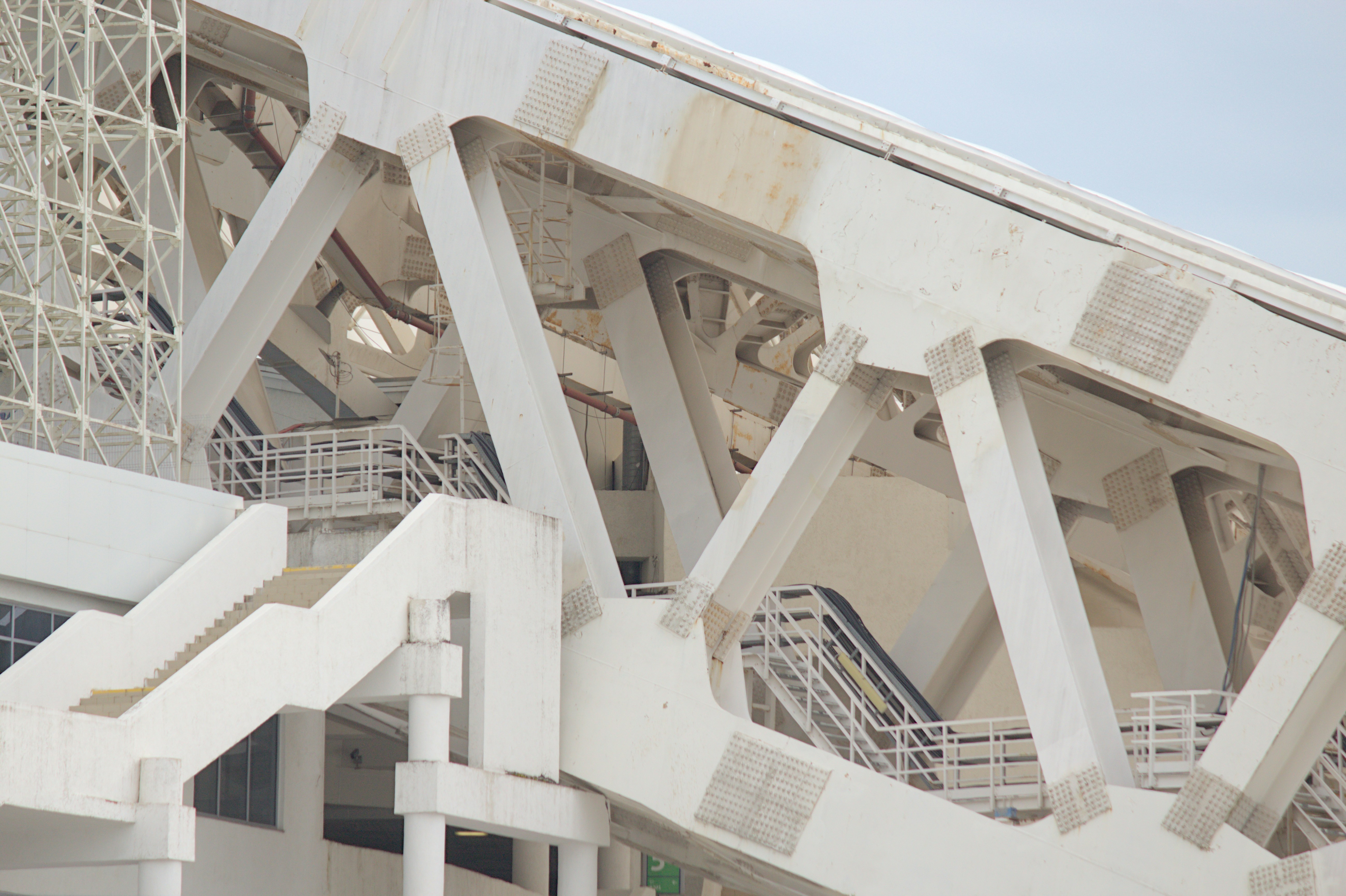 Industrial Geometry: Concrete Beams and Angles in Harsh Light