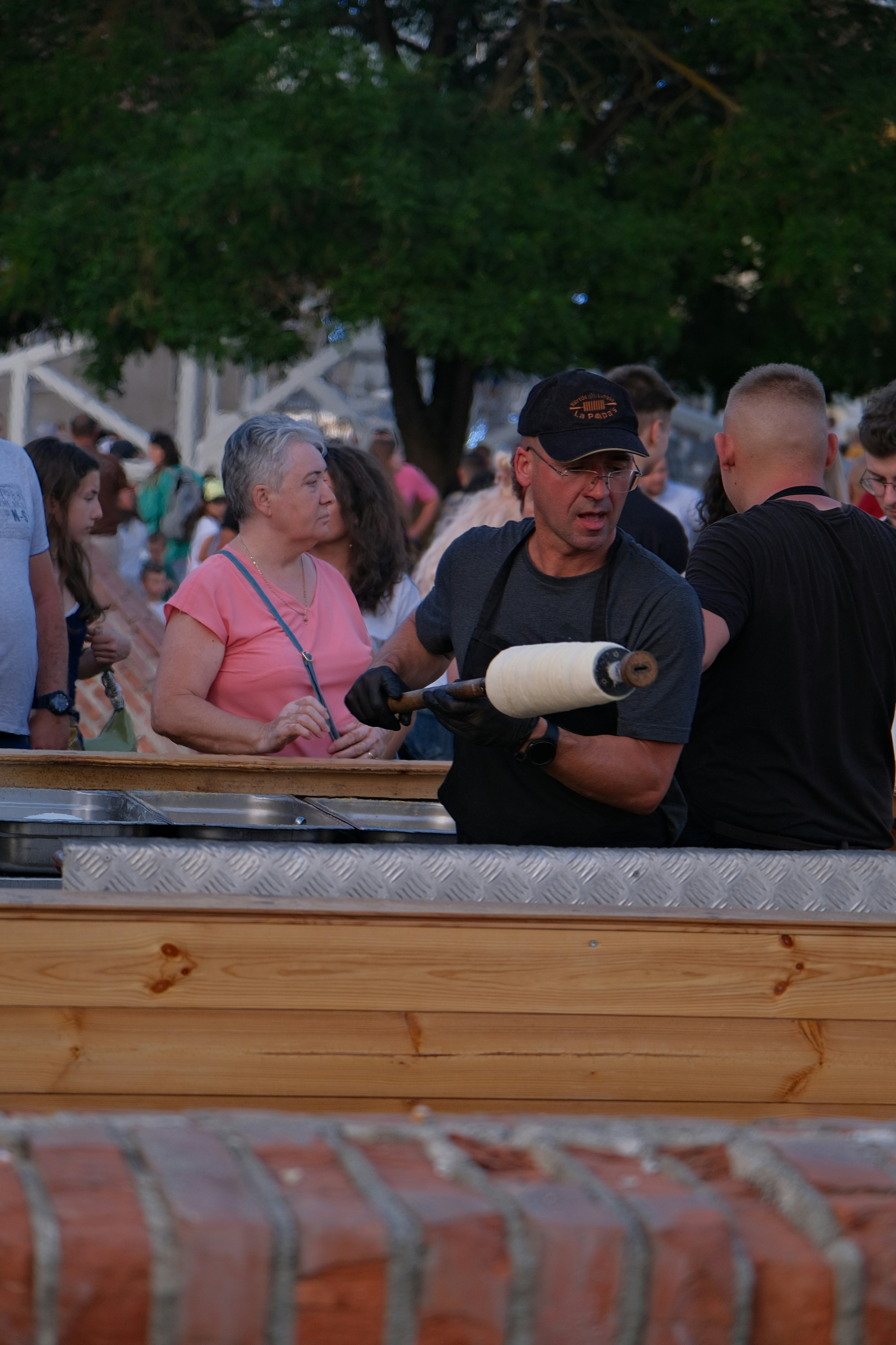 The Loader in the Crowd: A Vendor Prep Amid the Festival Buzz