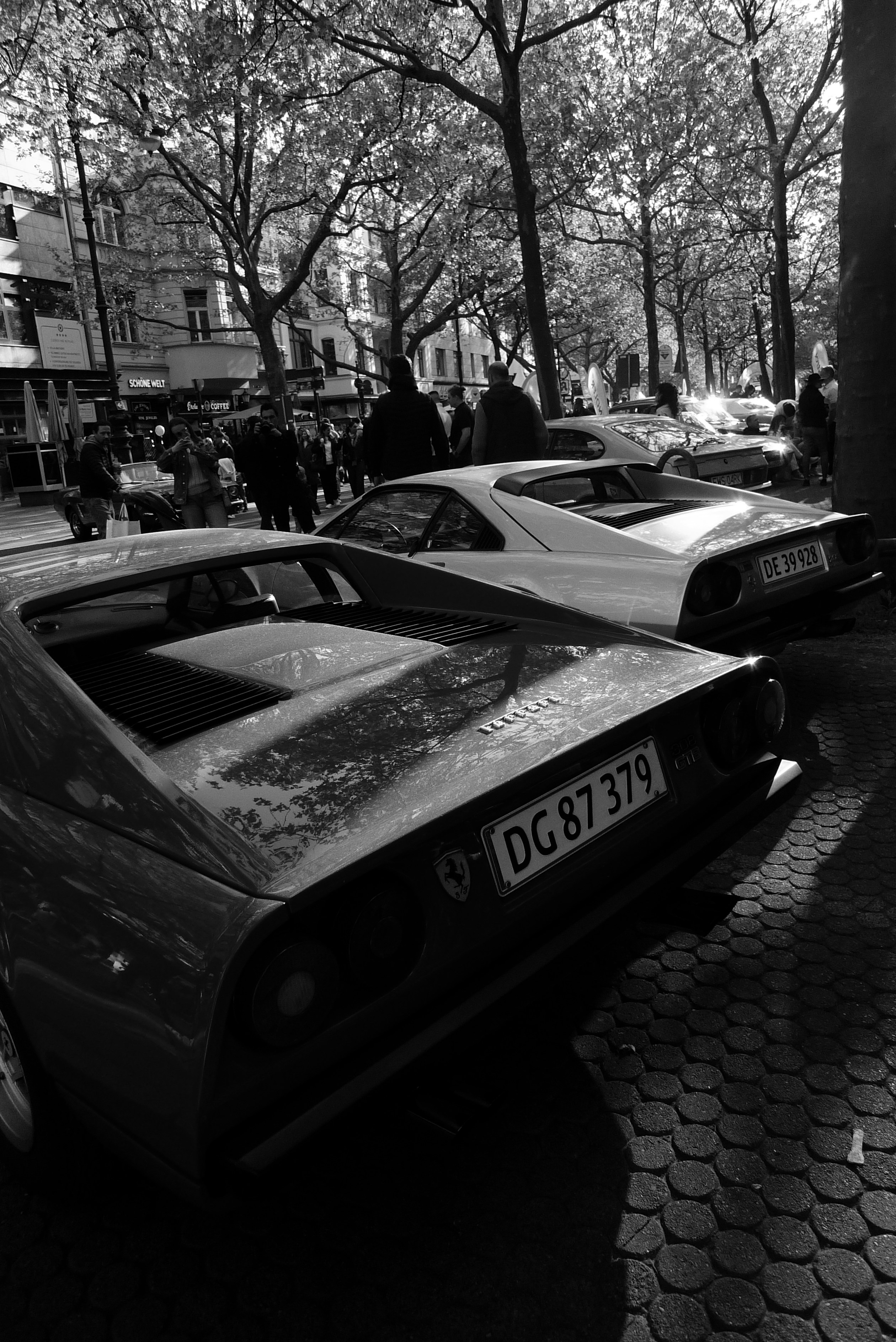 Chrome Echoes: Classic Sports Cars on a Parisian Street