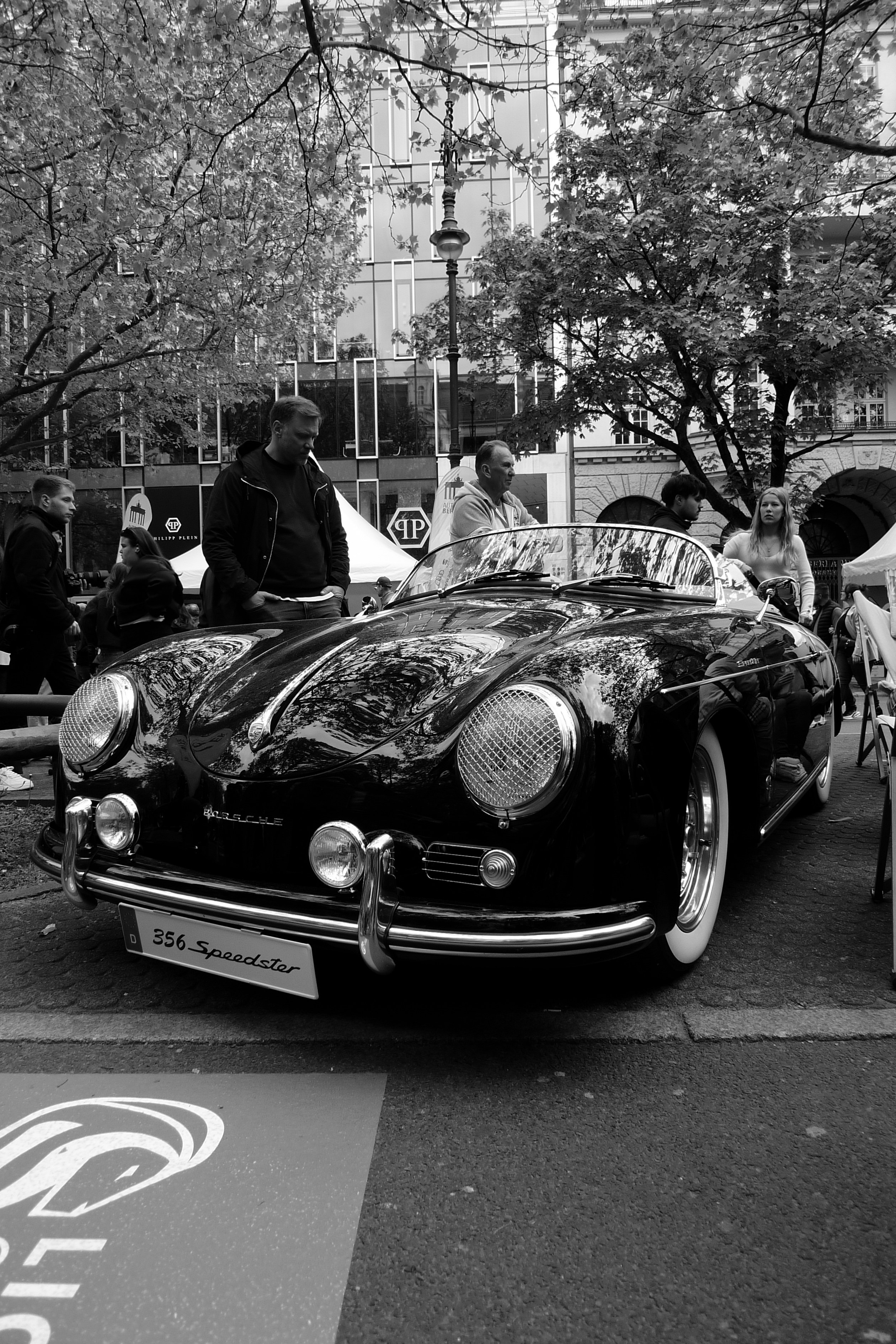 Chrome Reflections: Classic Roadster on a City Stage