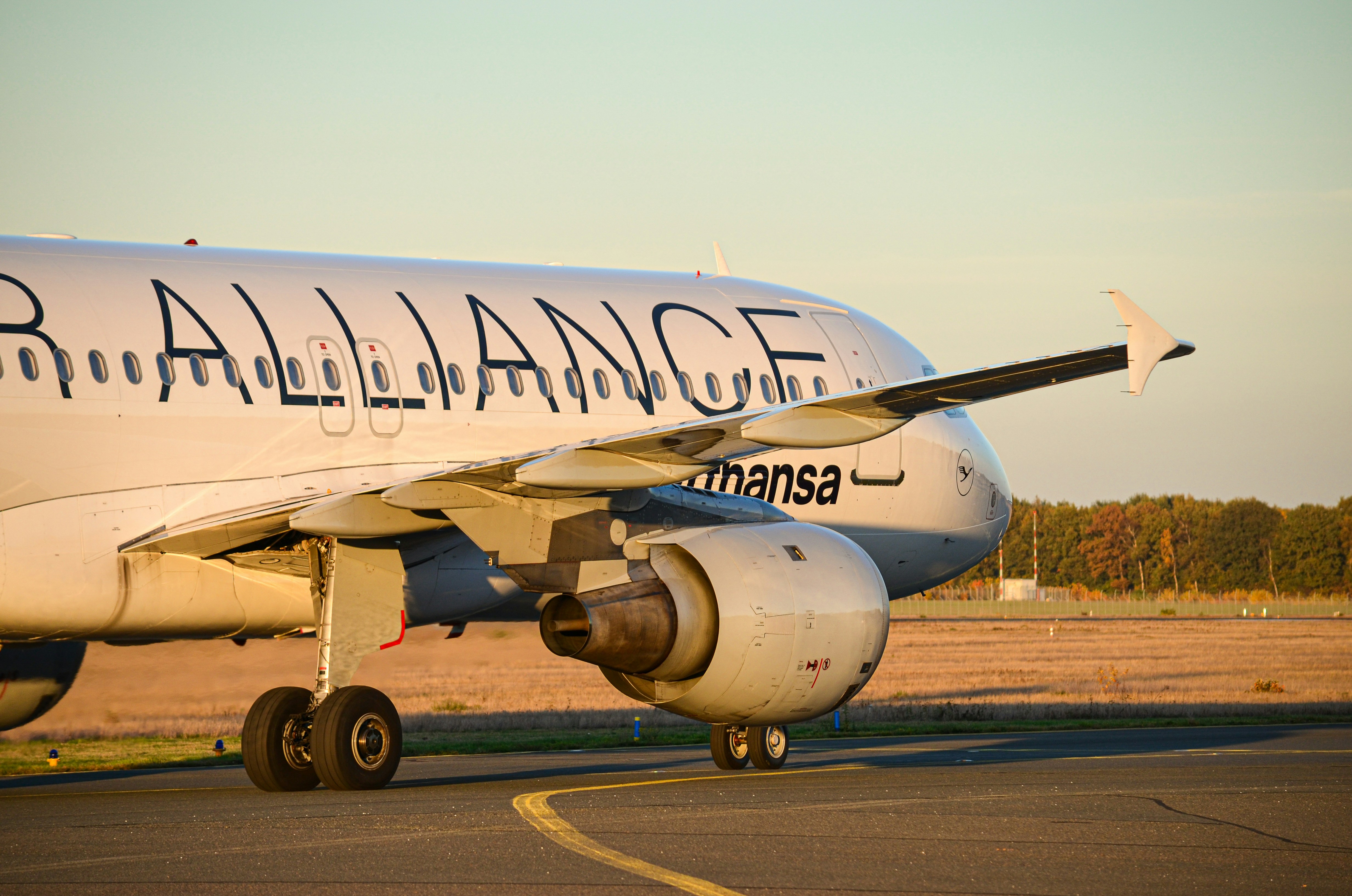 Taxiing A320: Sunset Rendezvous with Anlabeled Wings
