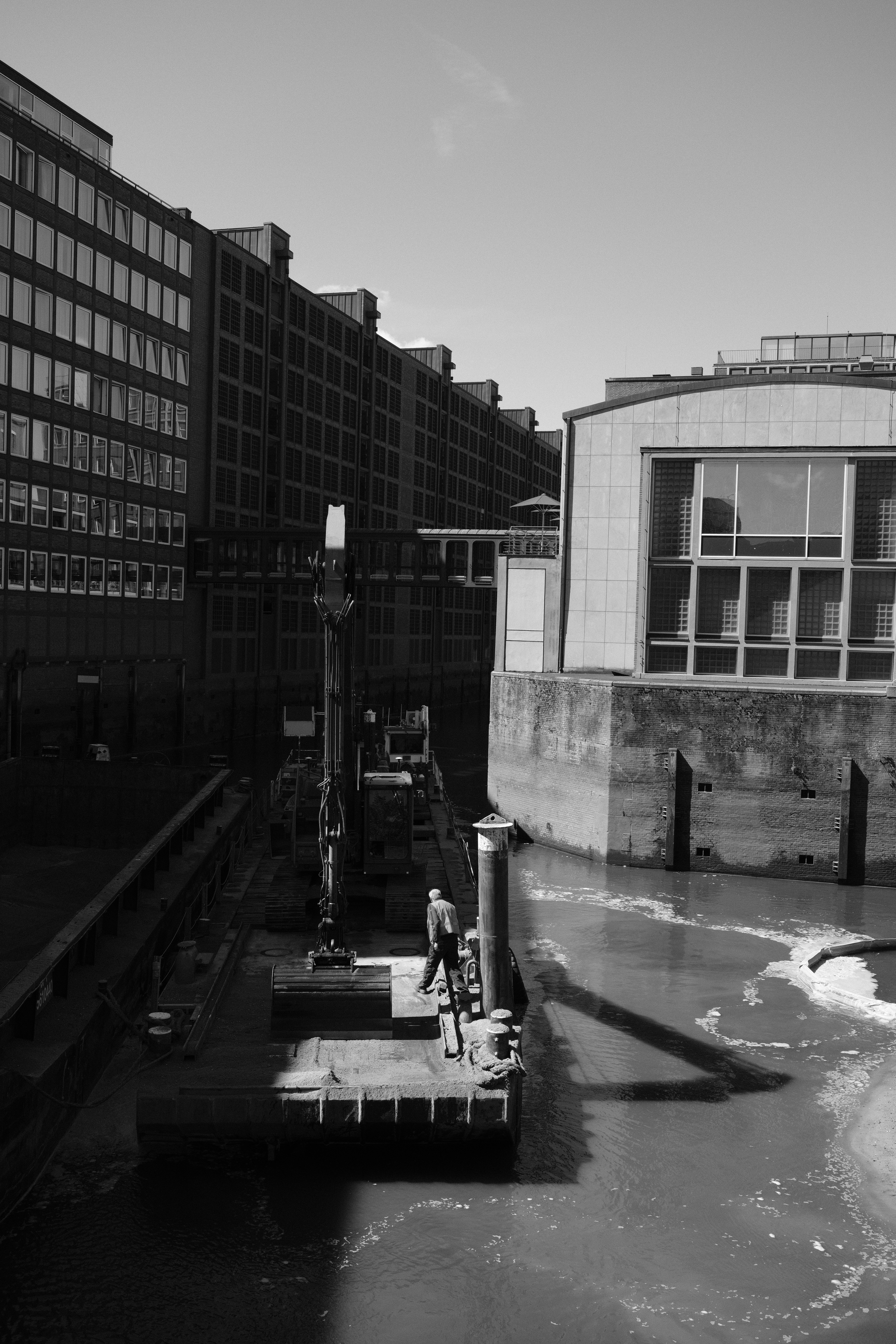 Industrial Pier at Dusk: A Quiet Walk Between Concrete Giants