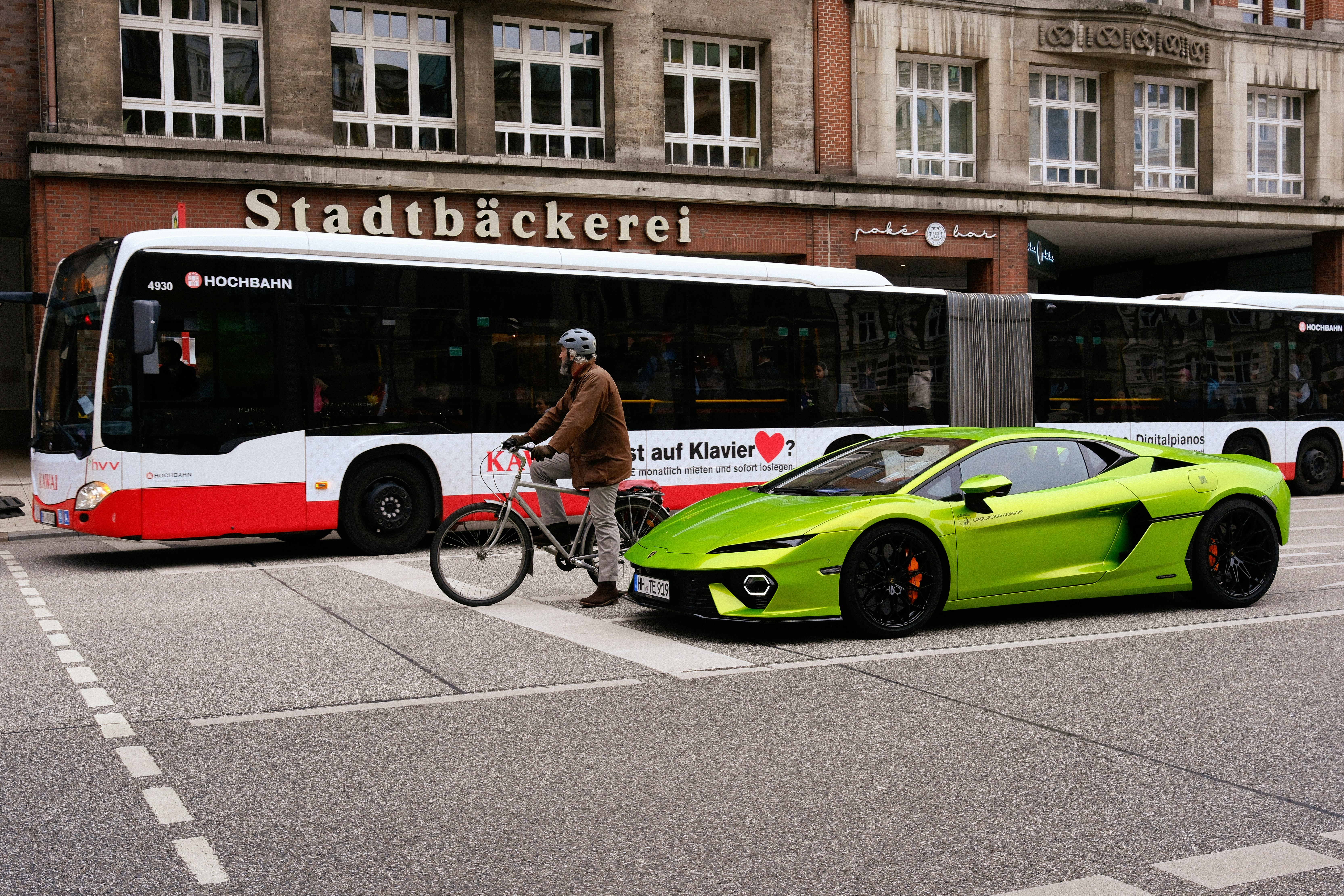 Green Gullwing on the Crosswalk: A City Snapshot