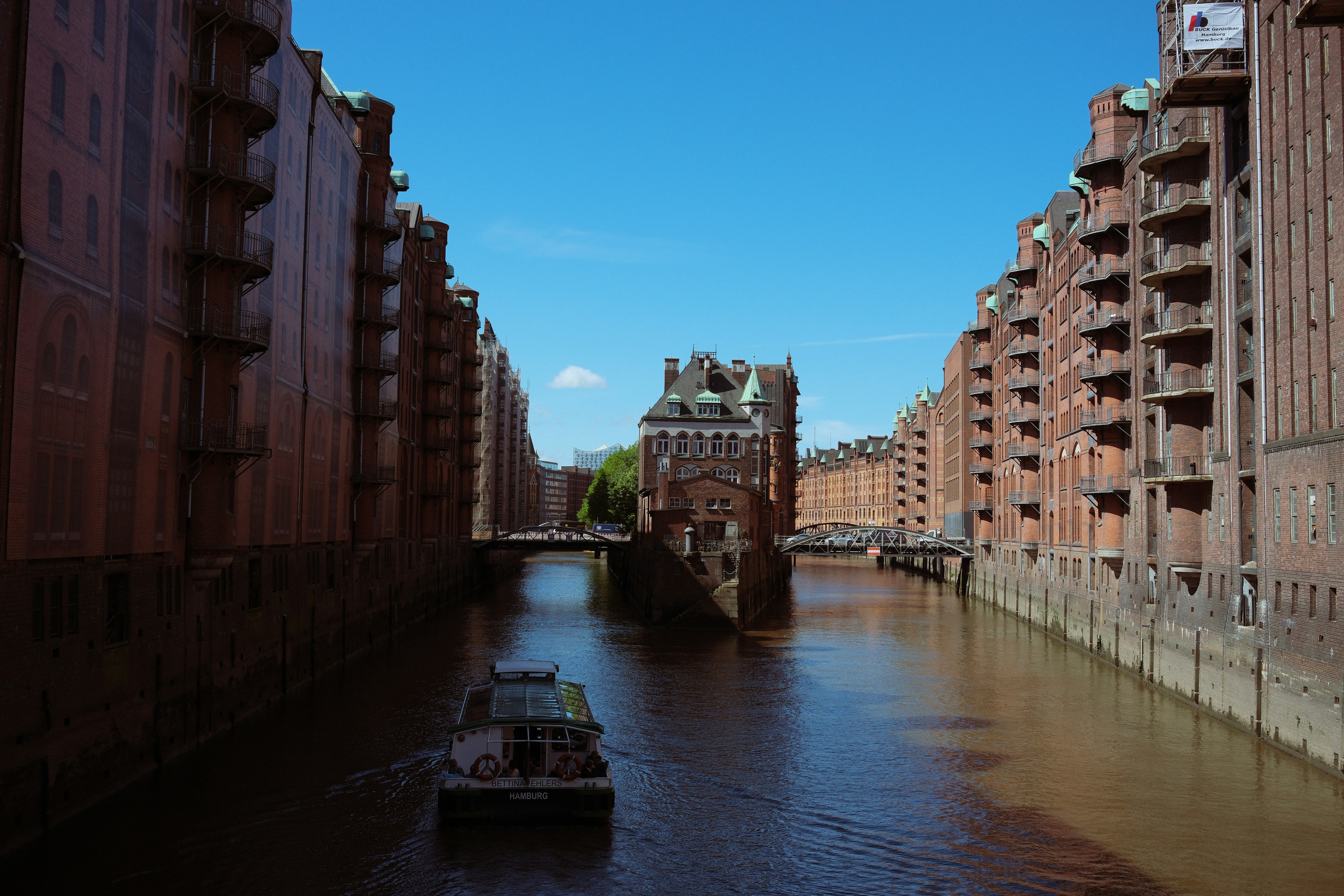 Towpath Arches: A Quiet Canal Between Brick Facades